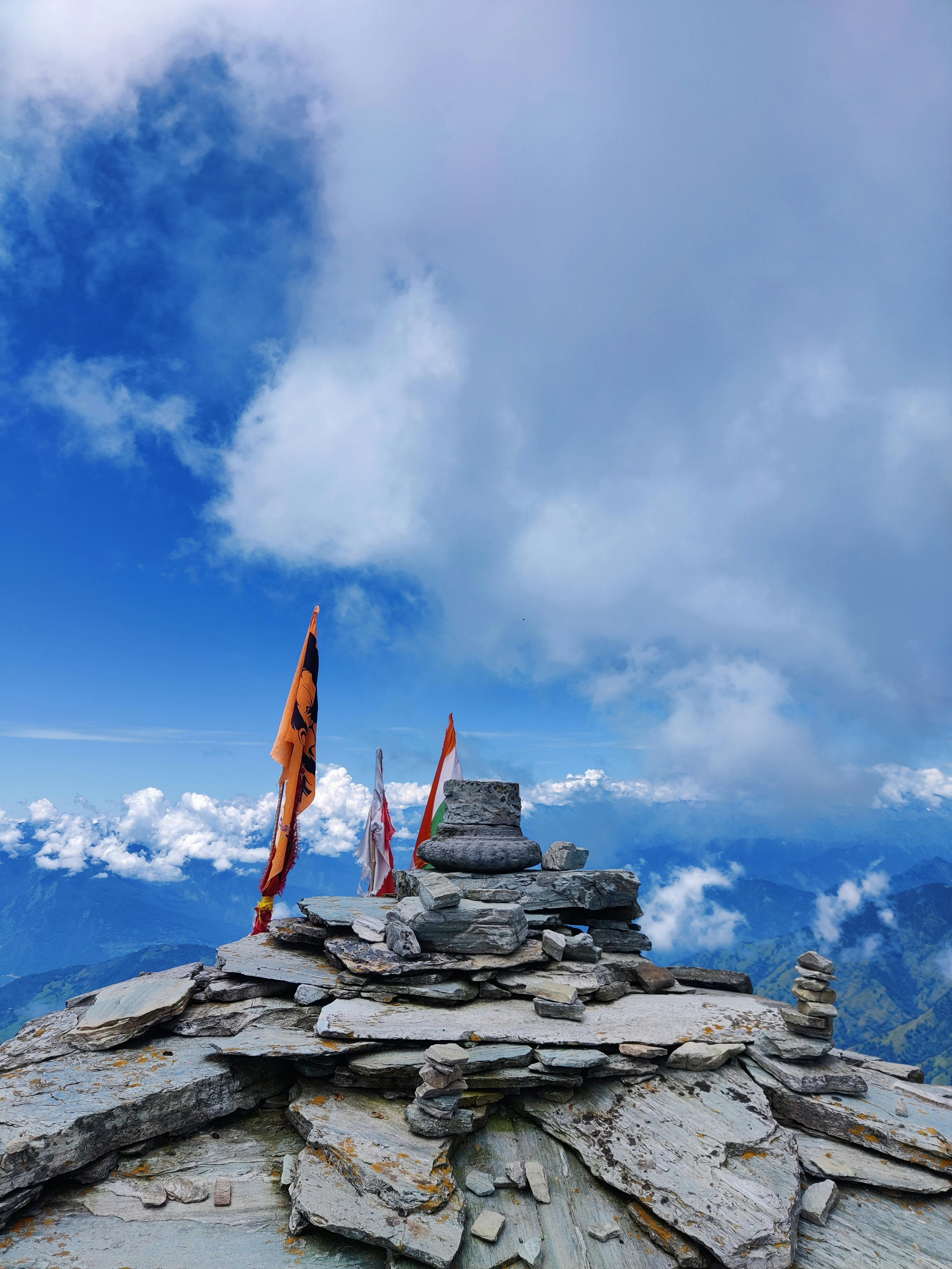 Flags on Mountain Peak · Free Stock Photo
