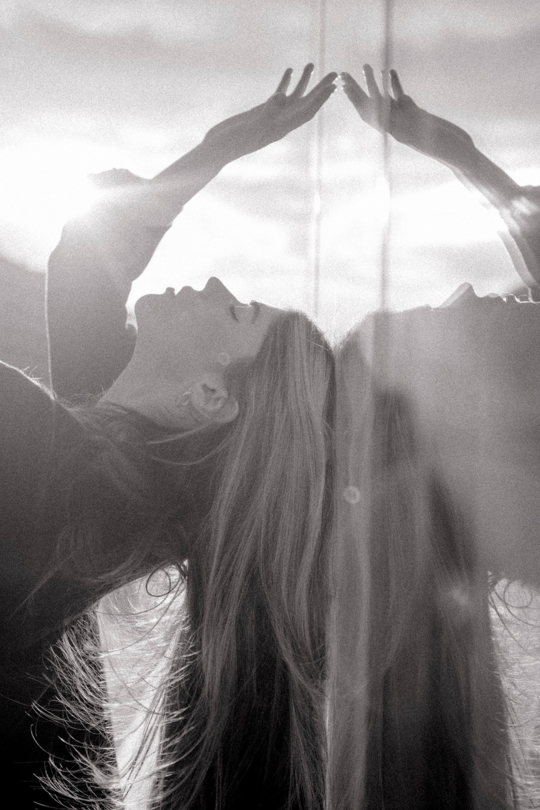 Woman Posing by Window in Sunlight · Free Stock Photo