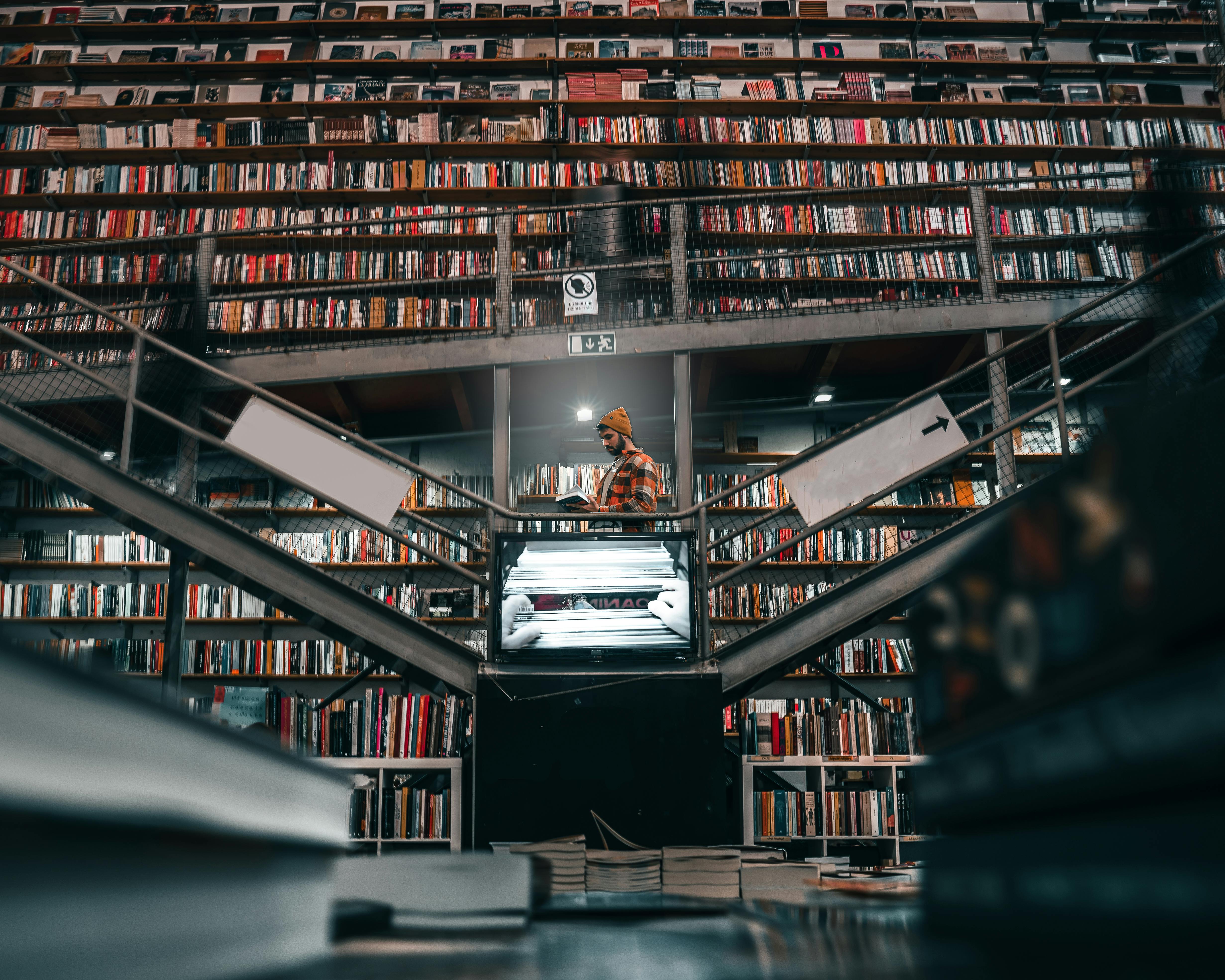 Top View of Library With Red Stairs · Free Stock Photo