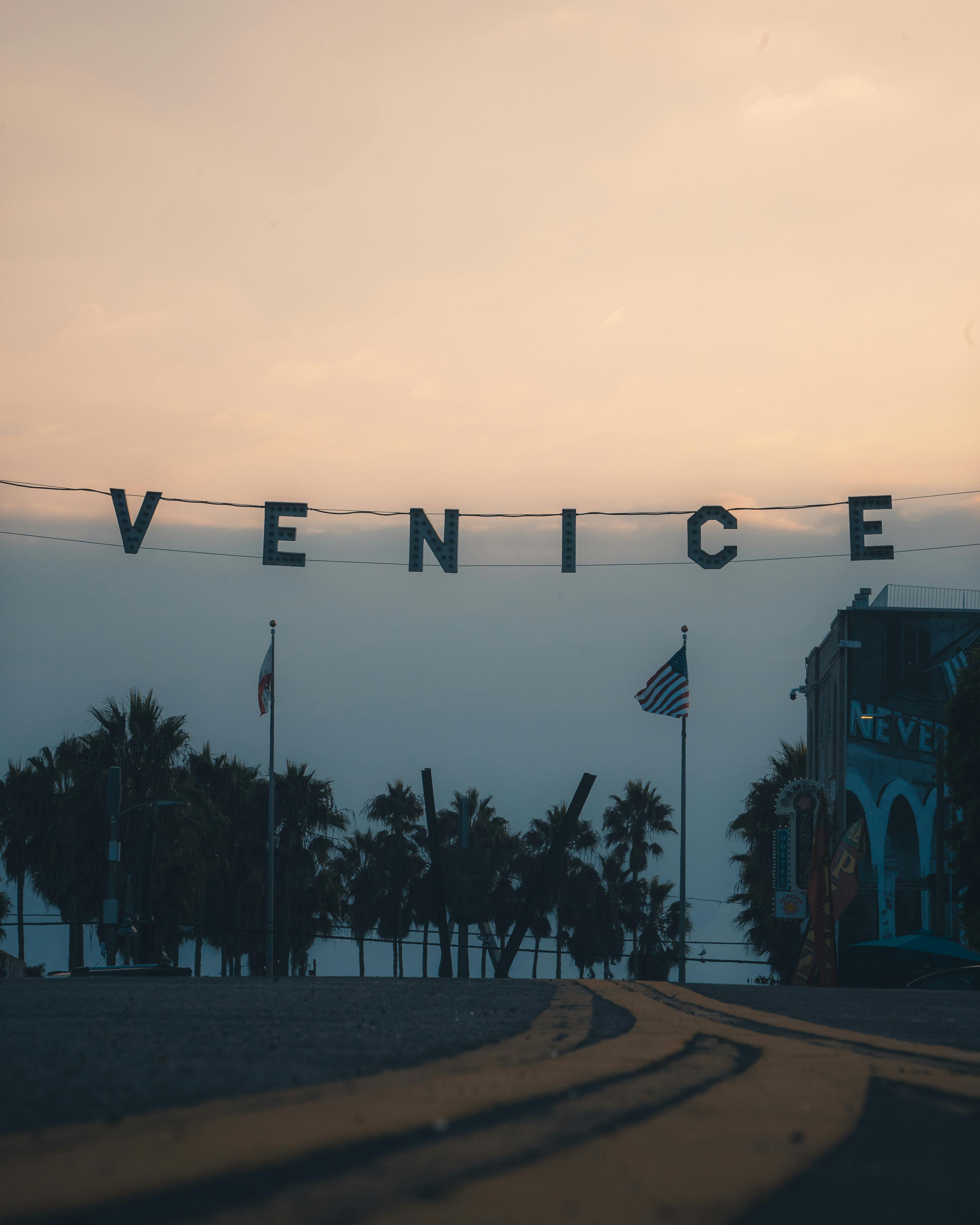 Venice Name over Street in Town at Dusk · Free Stock Photo
