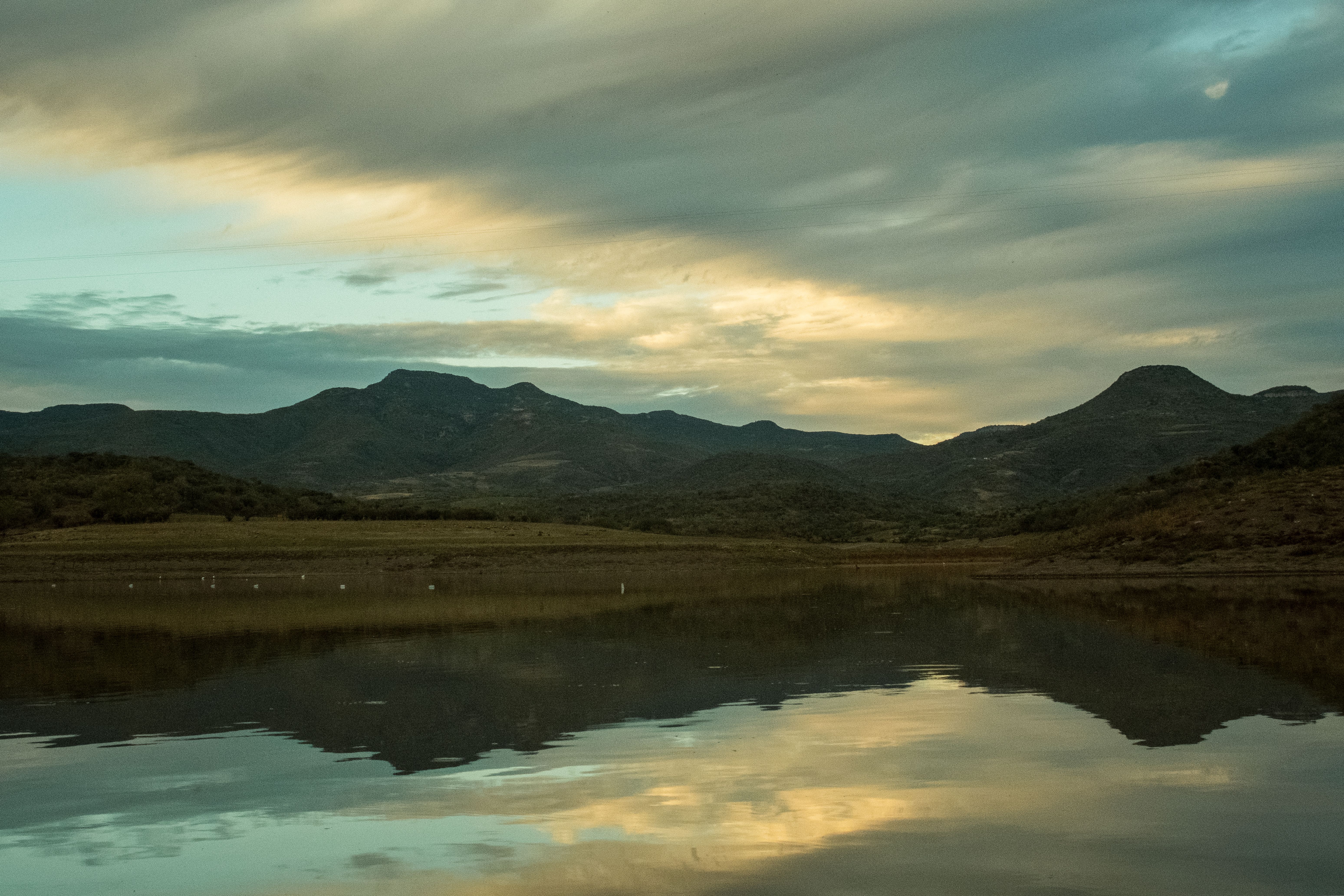 Lake and Hills in Countryside · Free Stock Photo