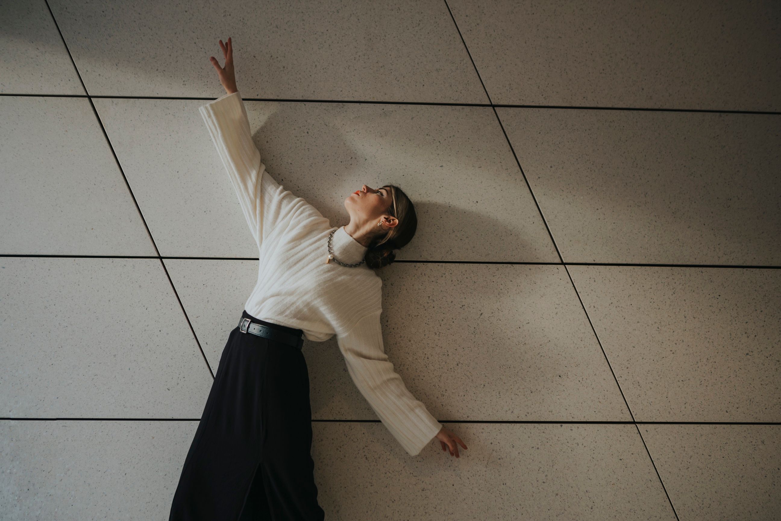 Photo Of Woman Laying On Road · Free Stock Photo