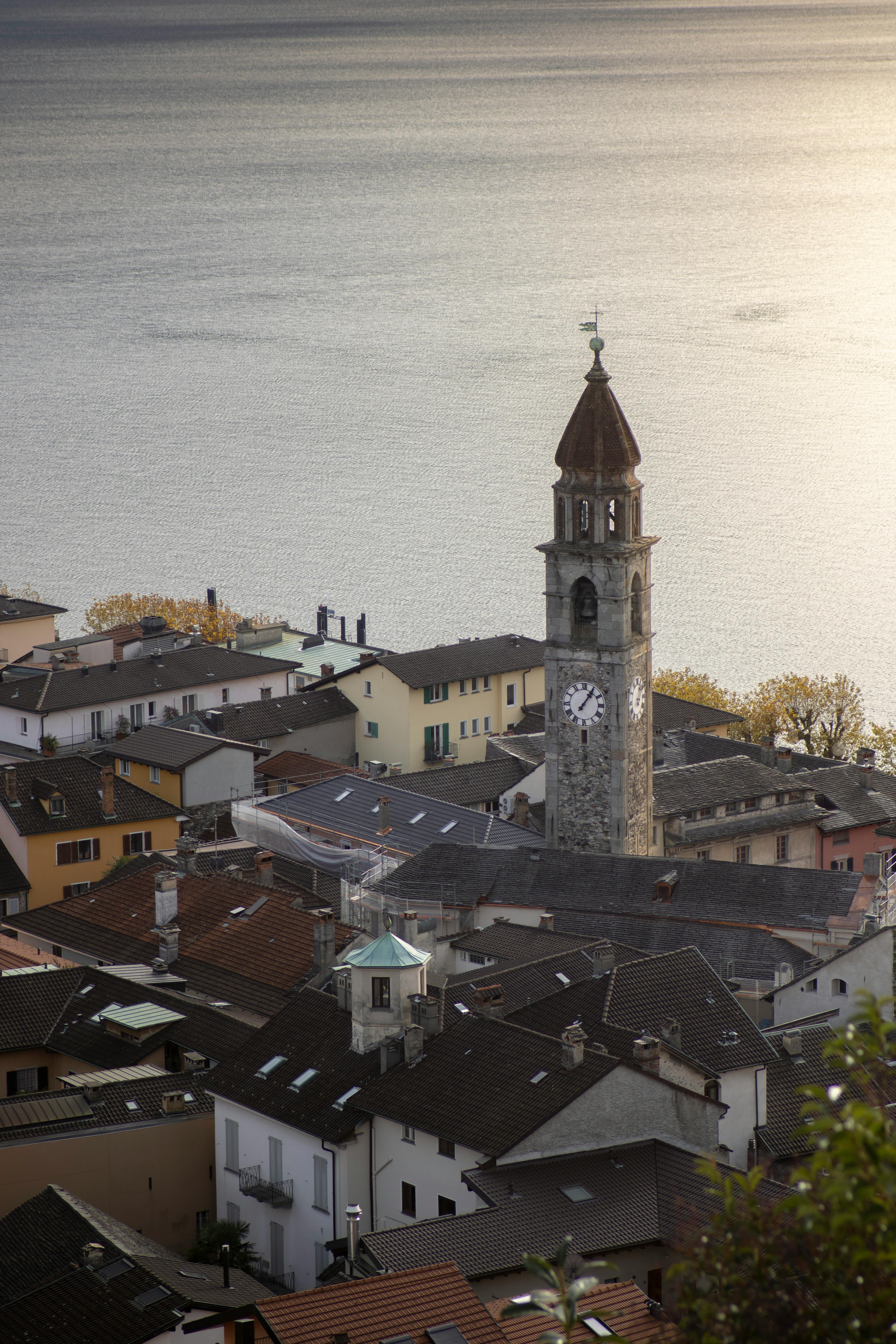 Swiss church near lake · Free Stock Photo