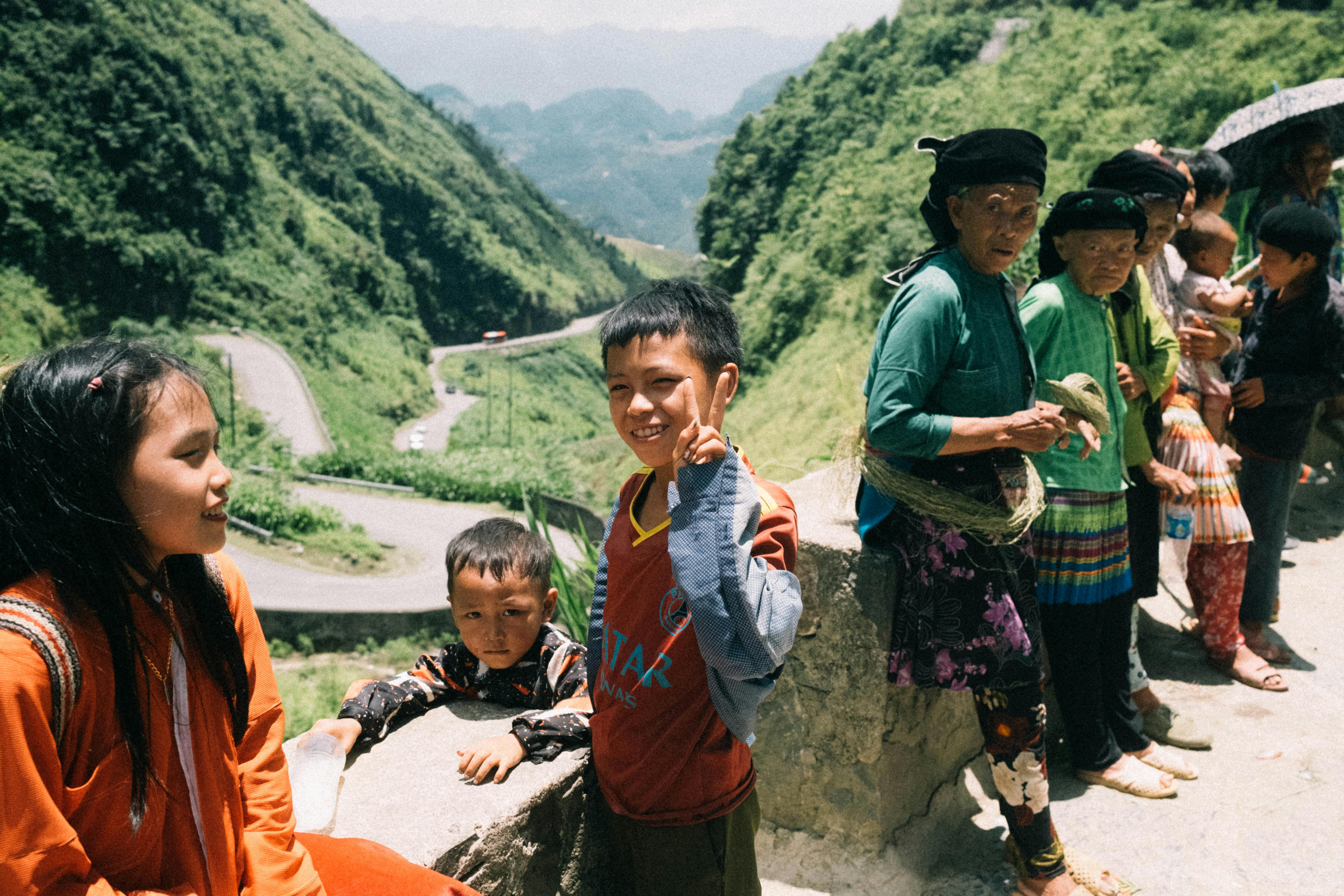 Group of Asian People against the Backdrop of Mountains and a Valley ...