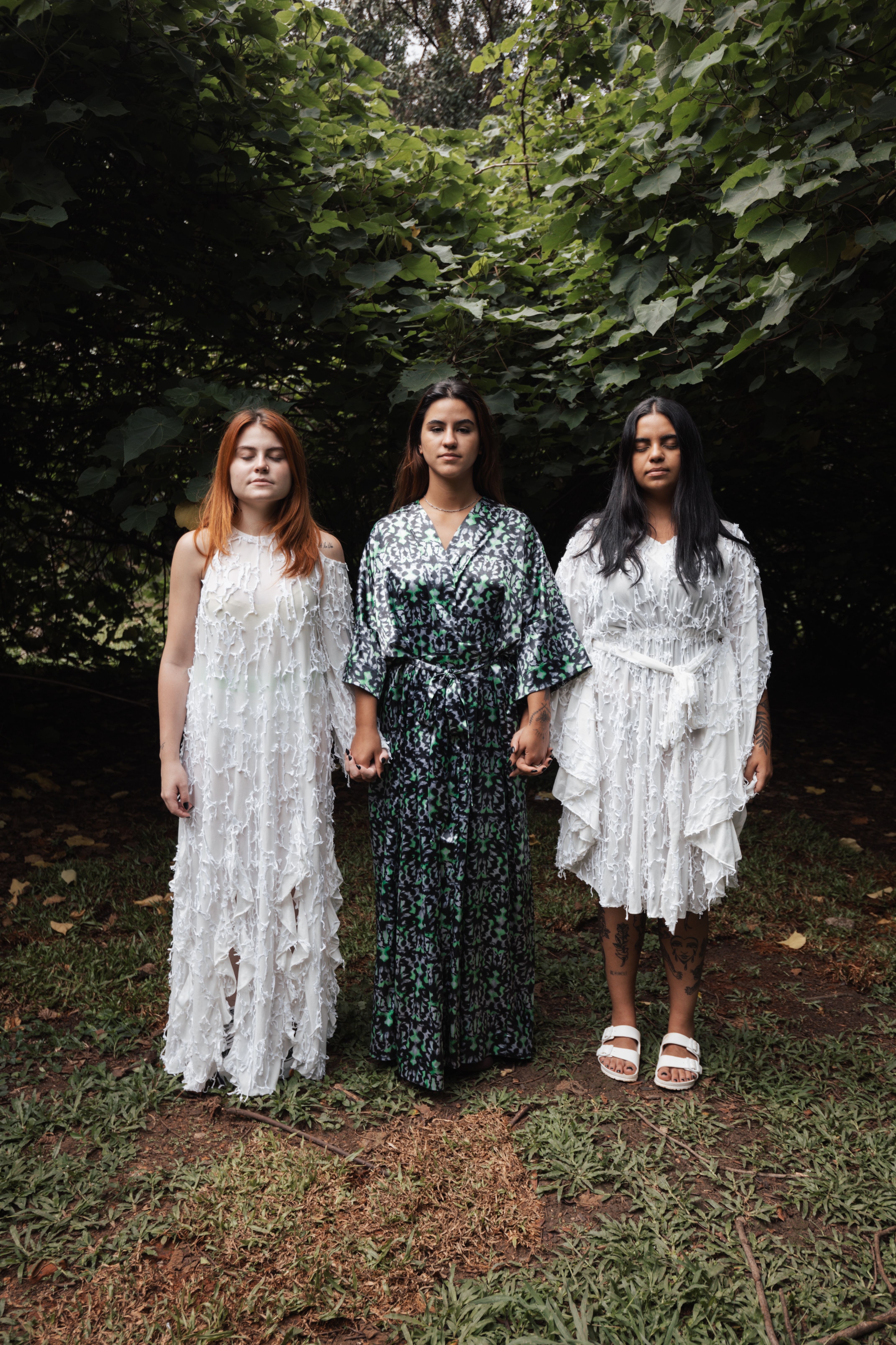Women in Dresses Holding Hands · Free Stock Photo