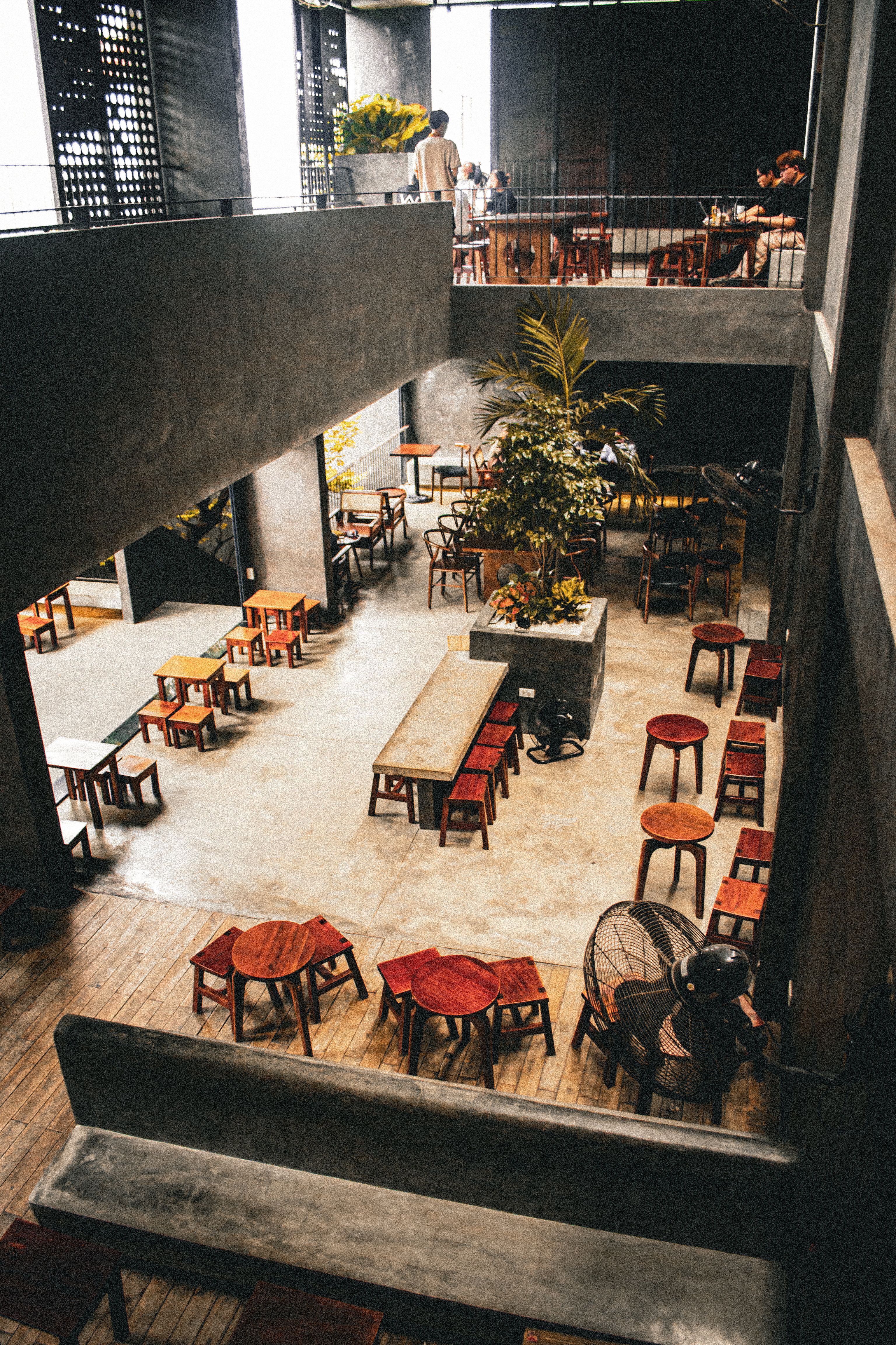 Furniture in Restaurant with Two Floors · Free Stock Photo