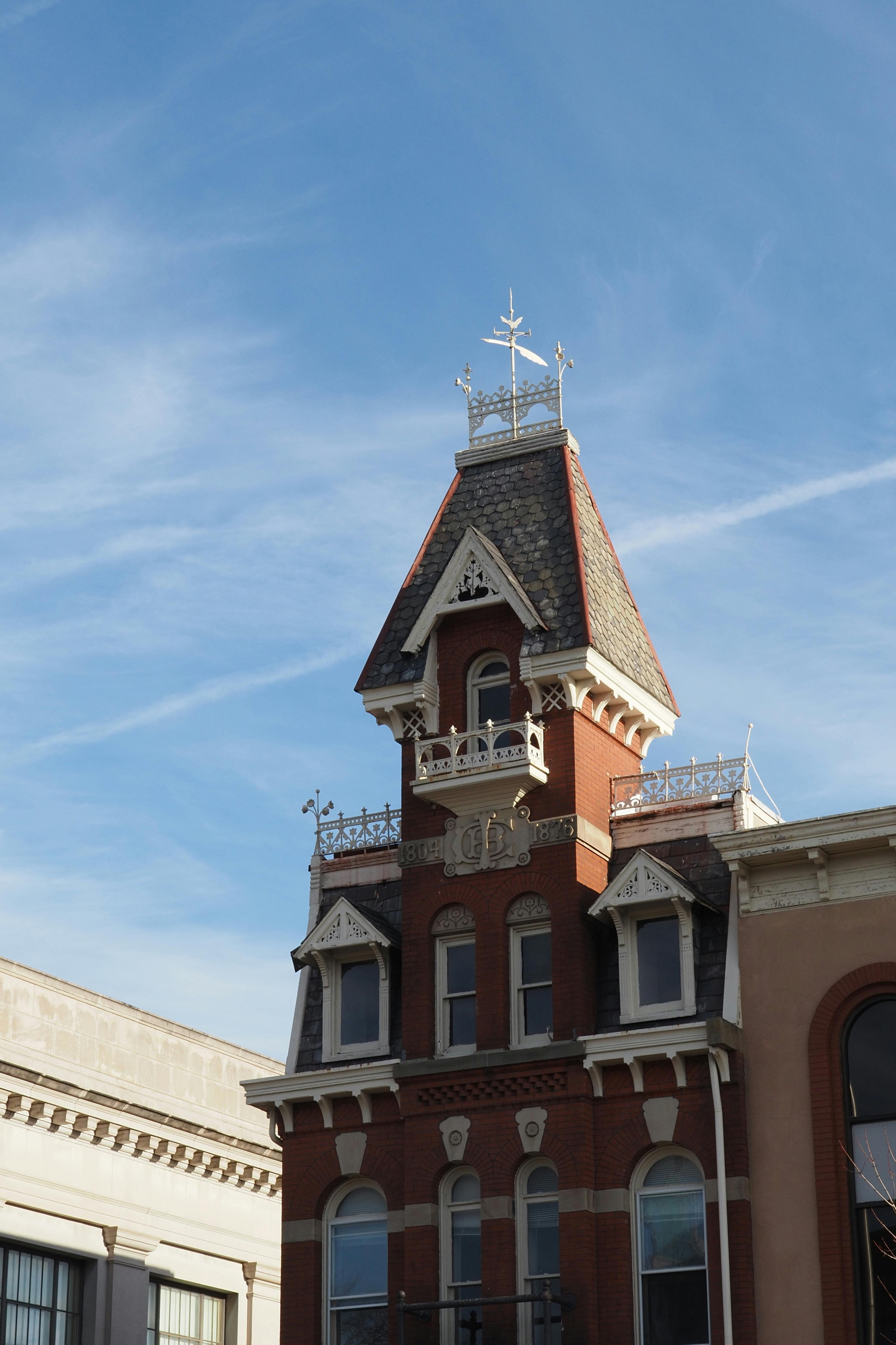 Angle Statue and Open Red Gate · Free Stock Photo