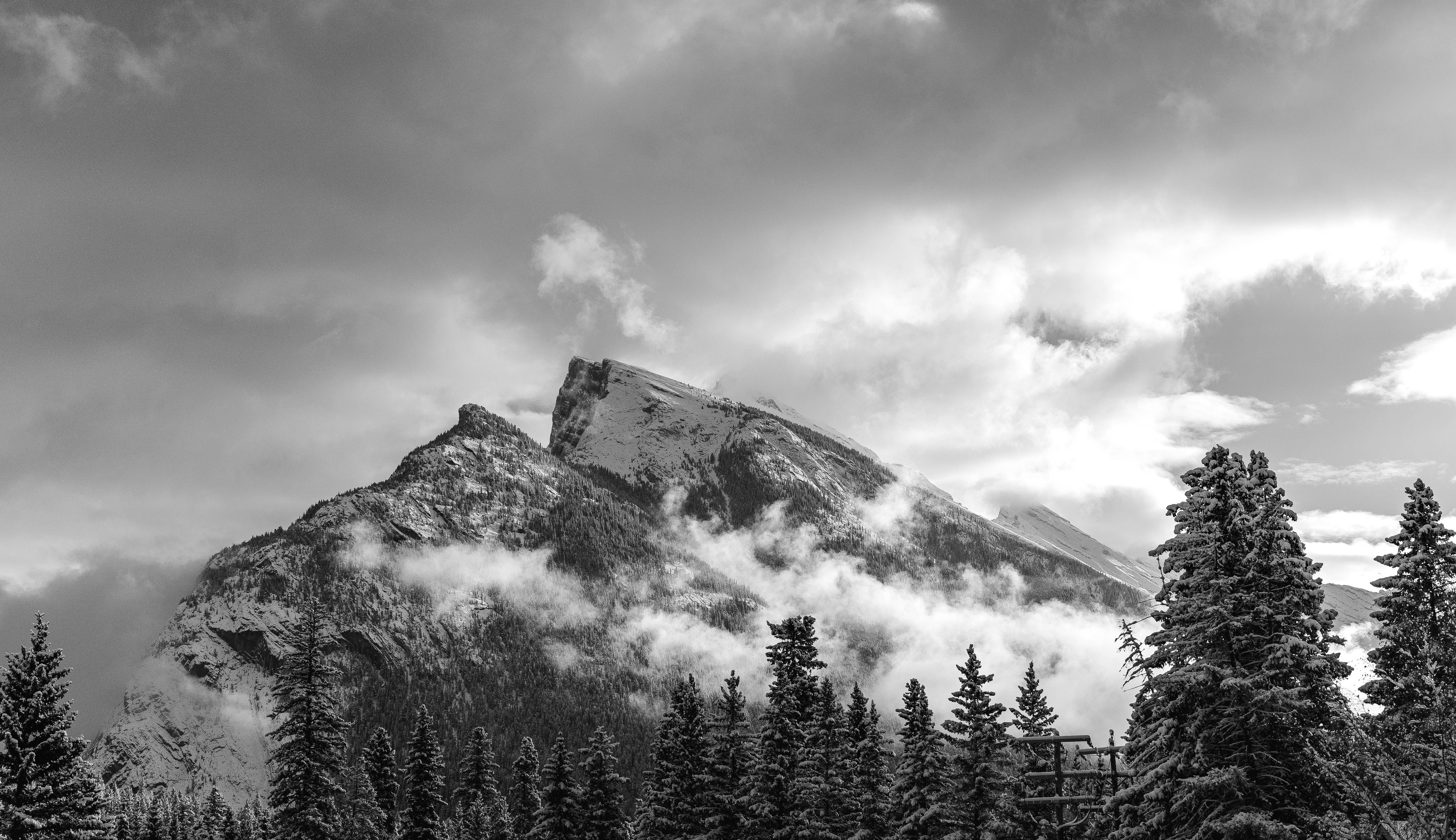 Grayscale Photo Of A Mountain Covered With Snow · Free Stock Photo