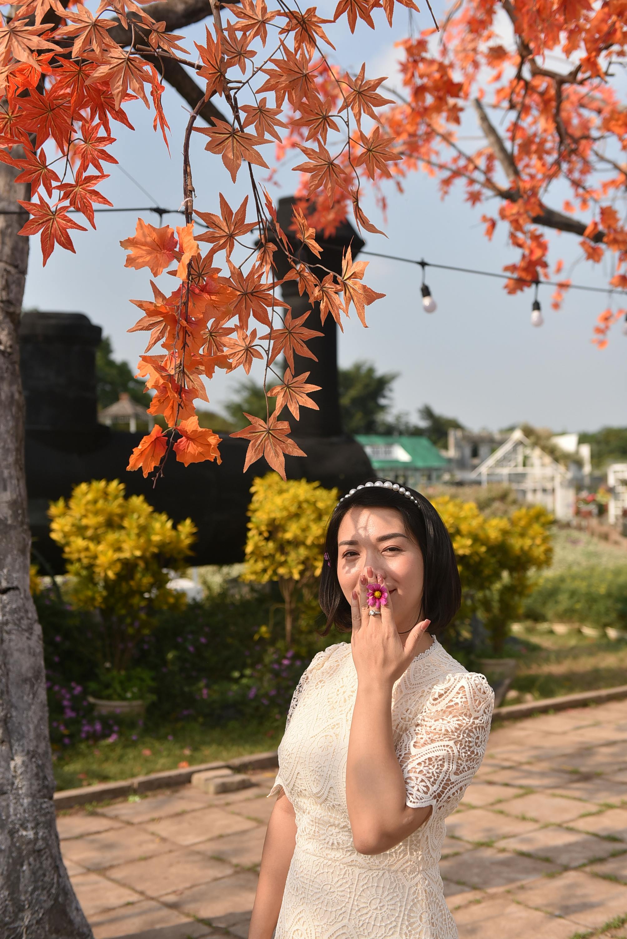 Portrait of a Woman Standing Outdoors · Free Stock Photo
