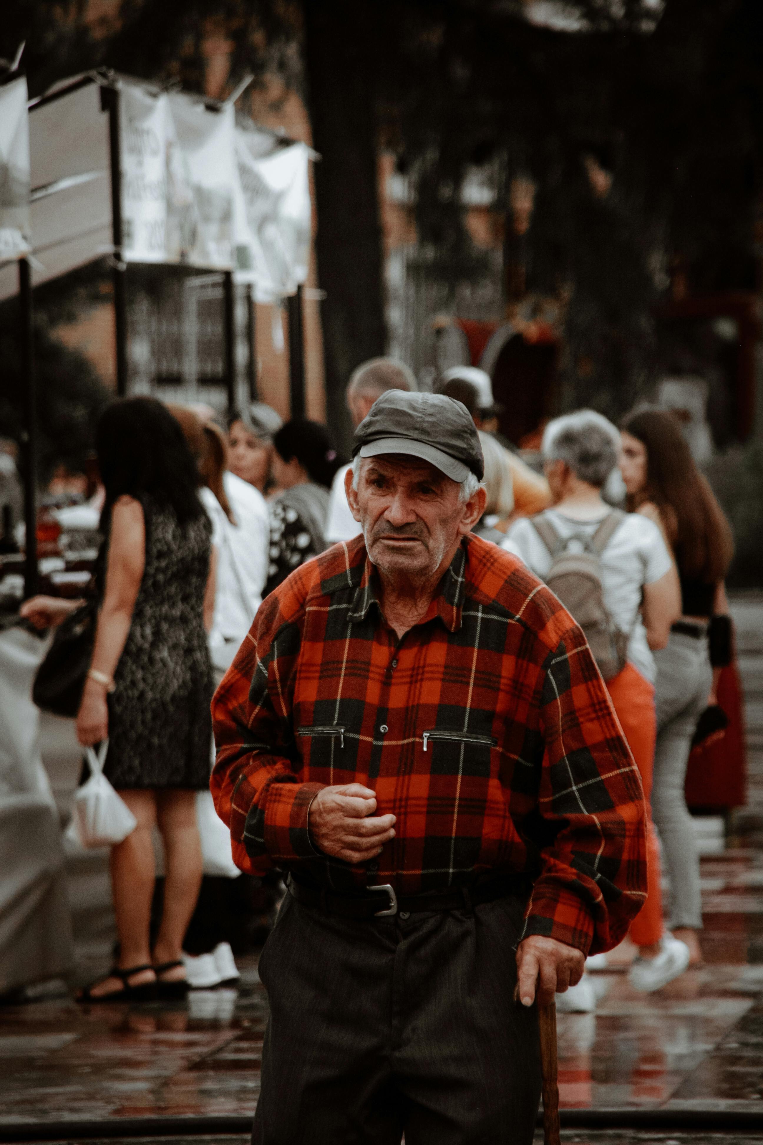 Elderly Man on a Street Market · Free Stock Photo