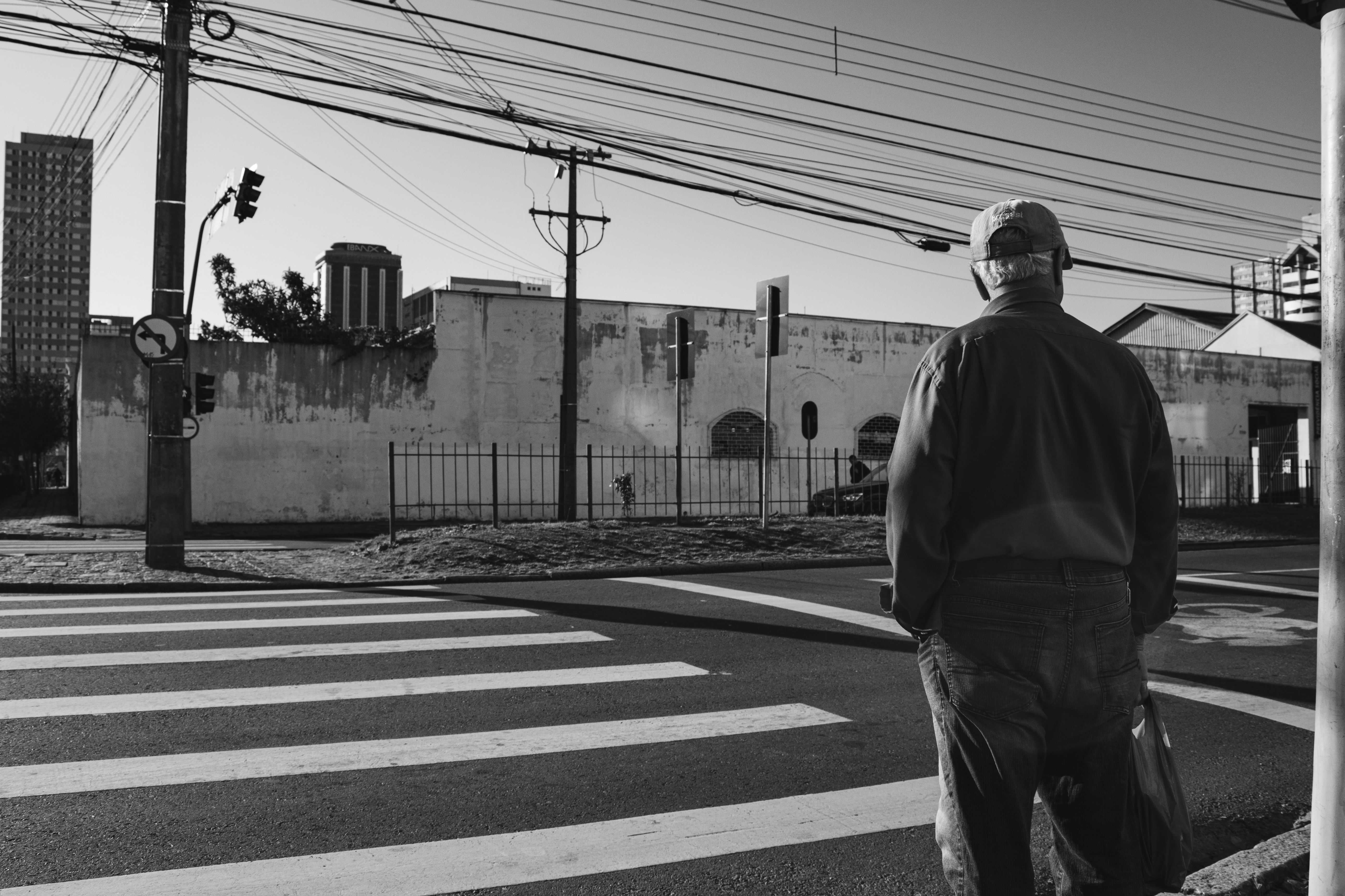 Candid Photo of a Pedestrian Crossing the Street · Free Stock Photo