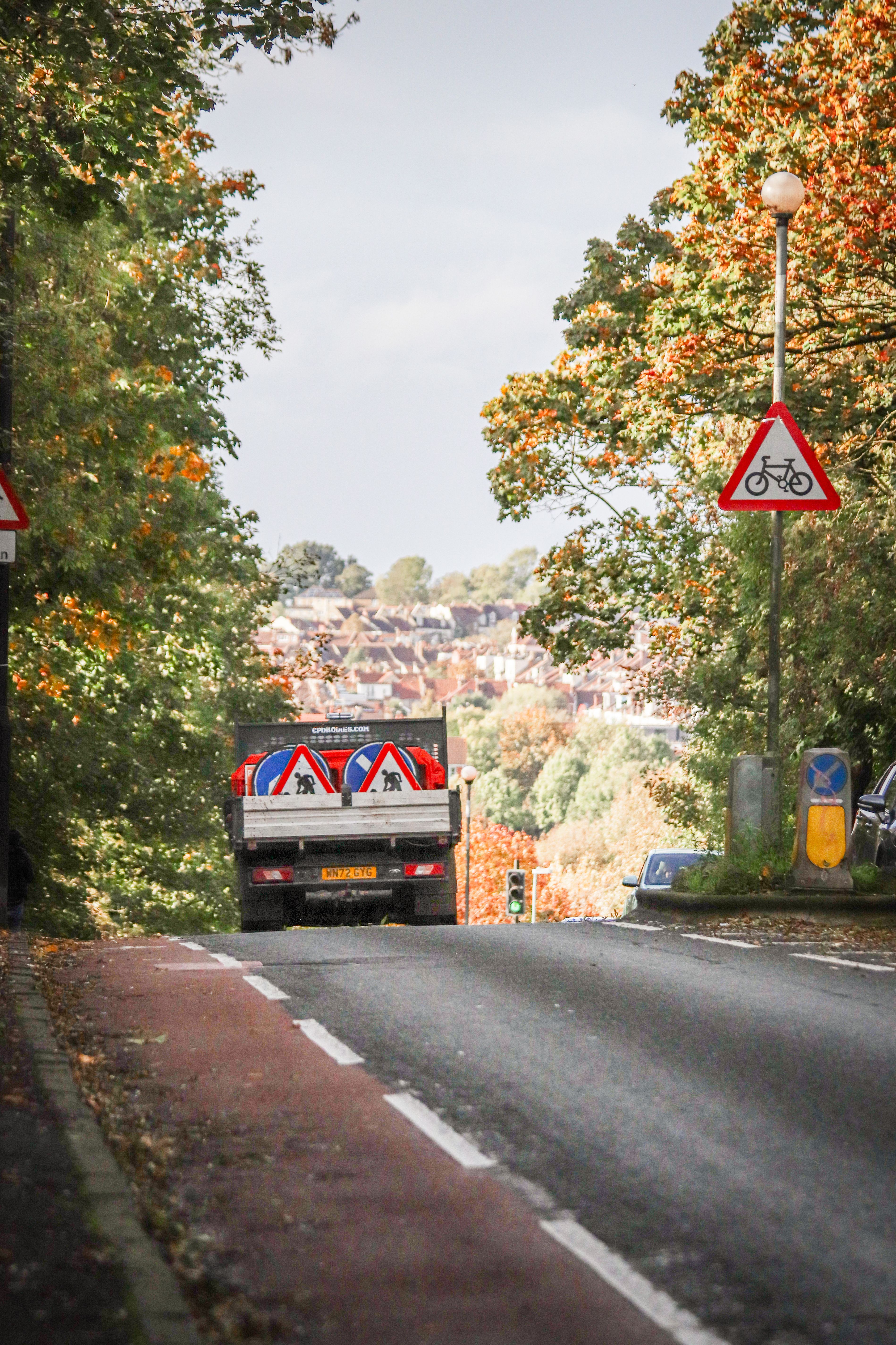 Lorry with Street Signs on Truck Bed · Free Stock Photo