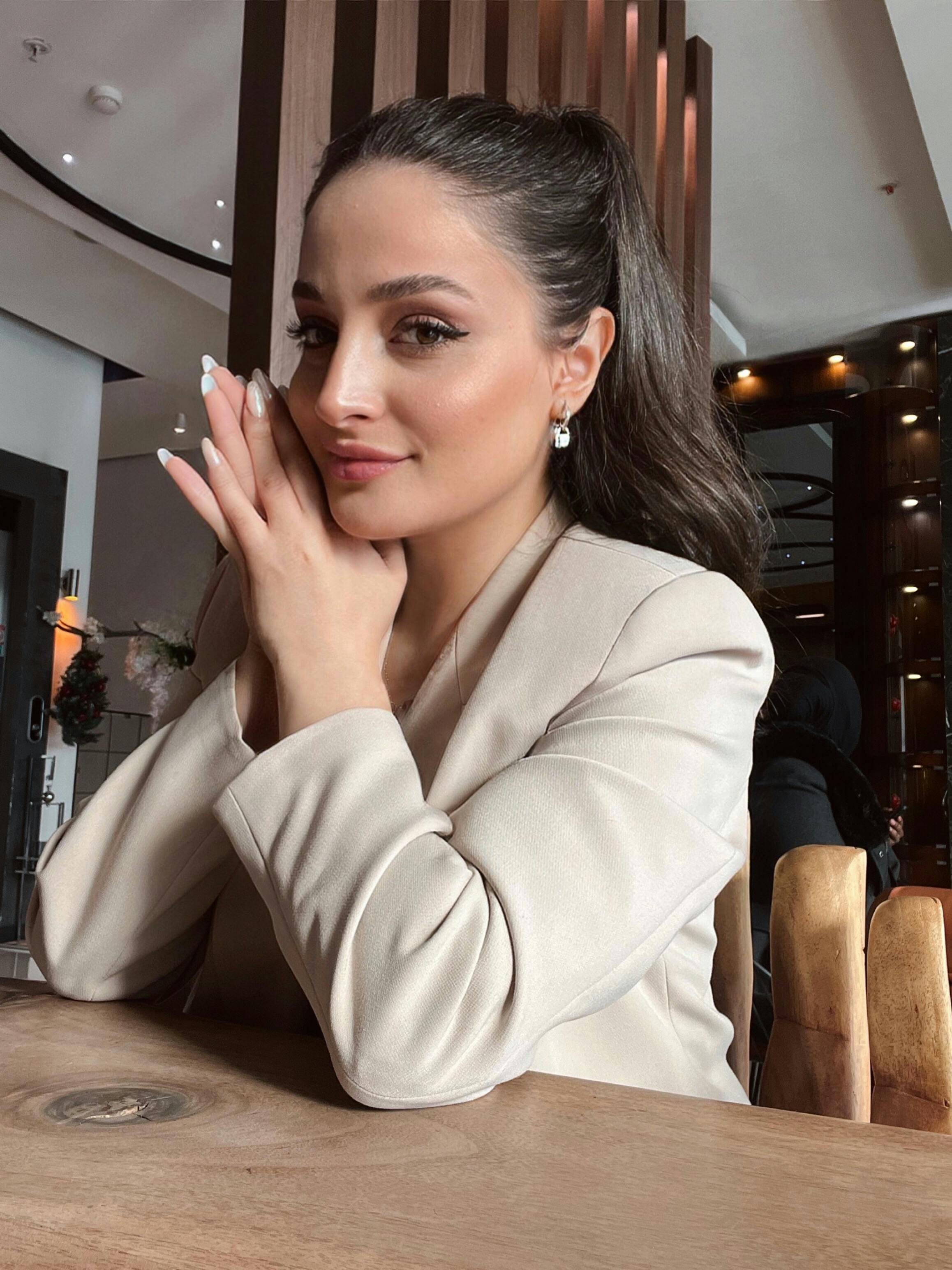 Young Elegant Woman Sitting at the Table · Free Stock Photo Young Elegant Woman Sitting at the Table · Free Stock Photo