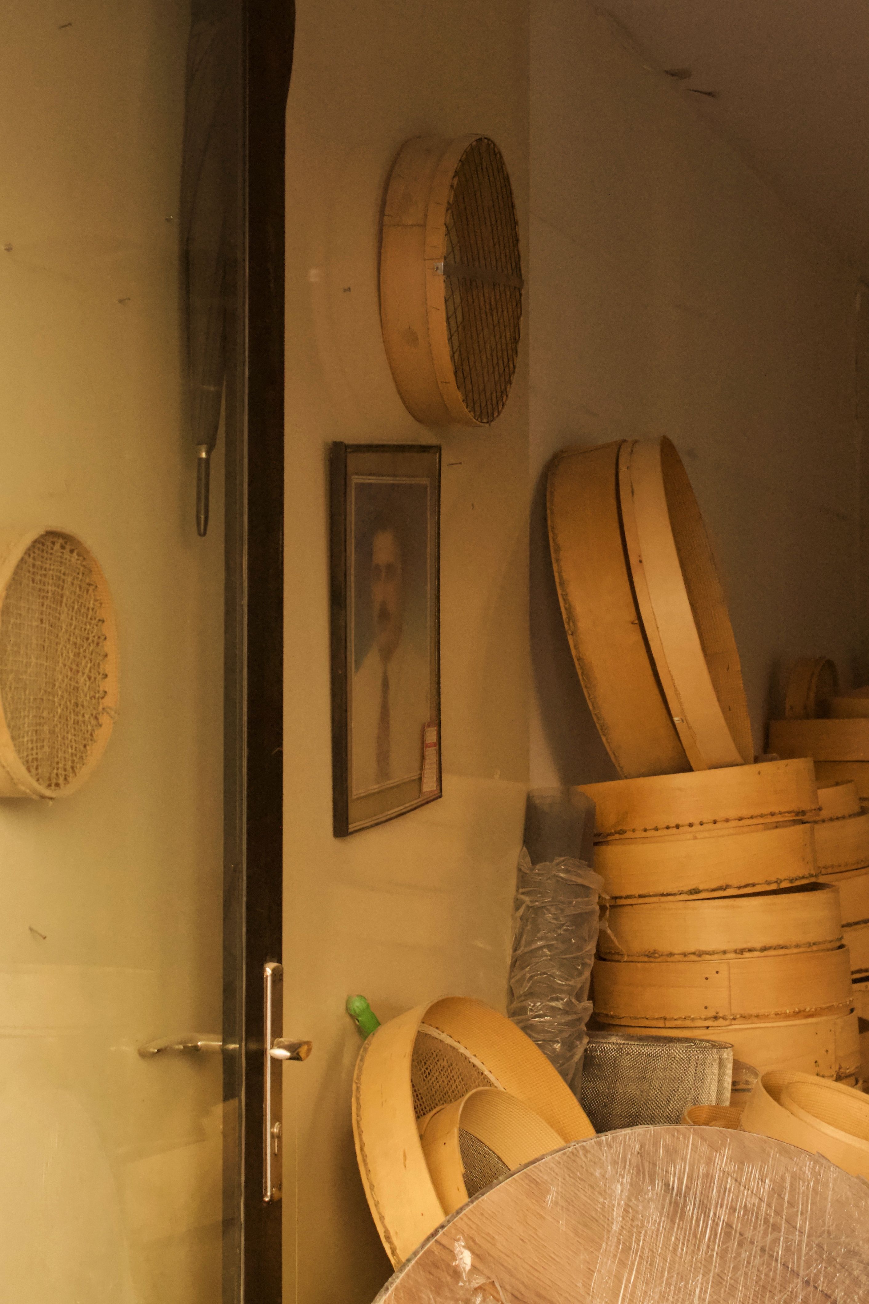 Wooden Trays near Picture on Wall and Door · Free Stock Photo