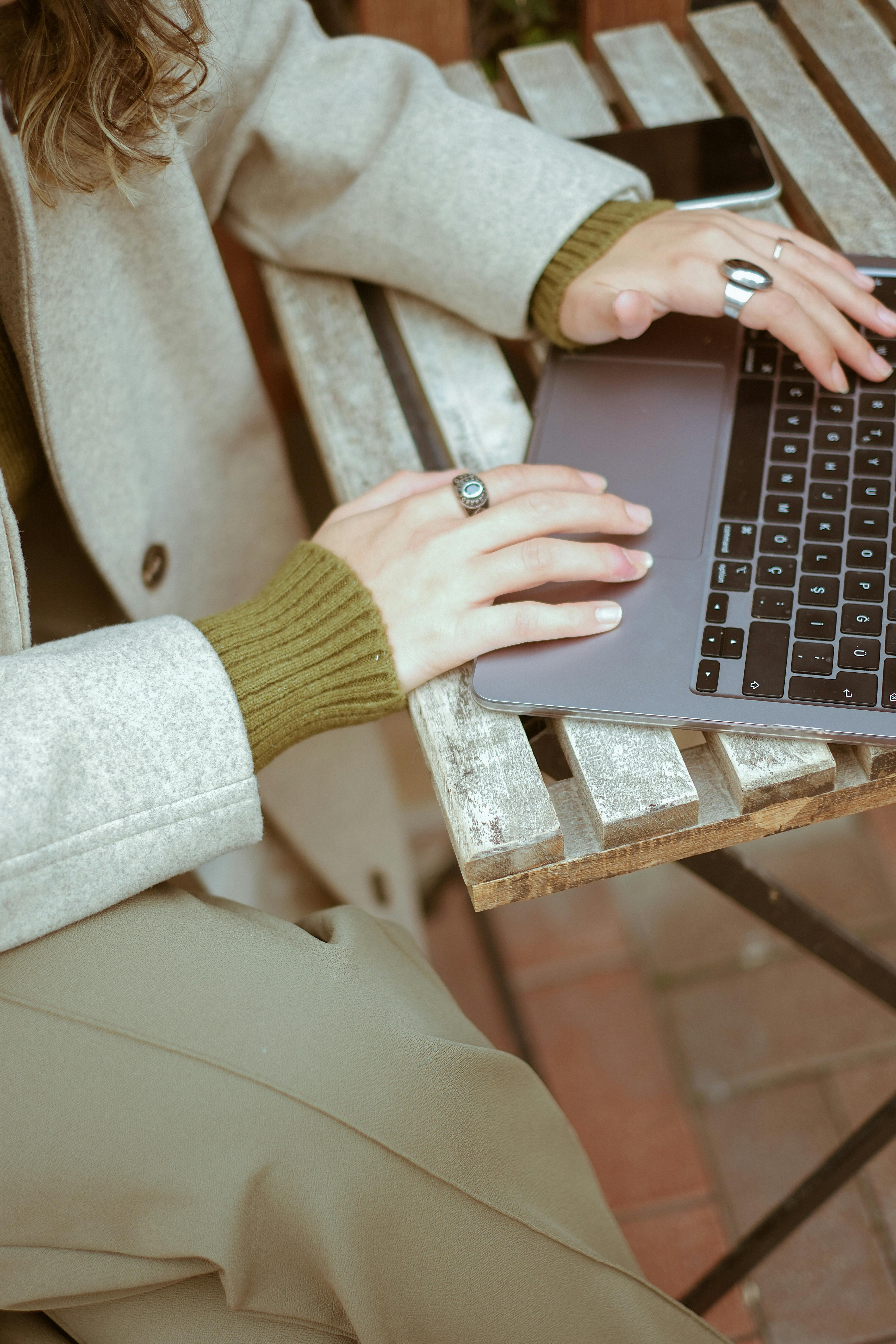 Woman Working Outdoor on Laptop · Free Stock Photo