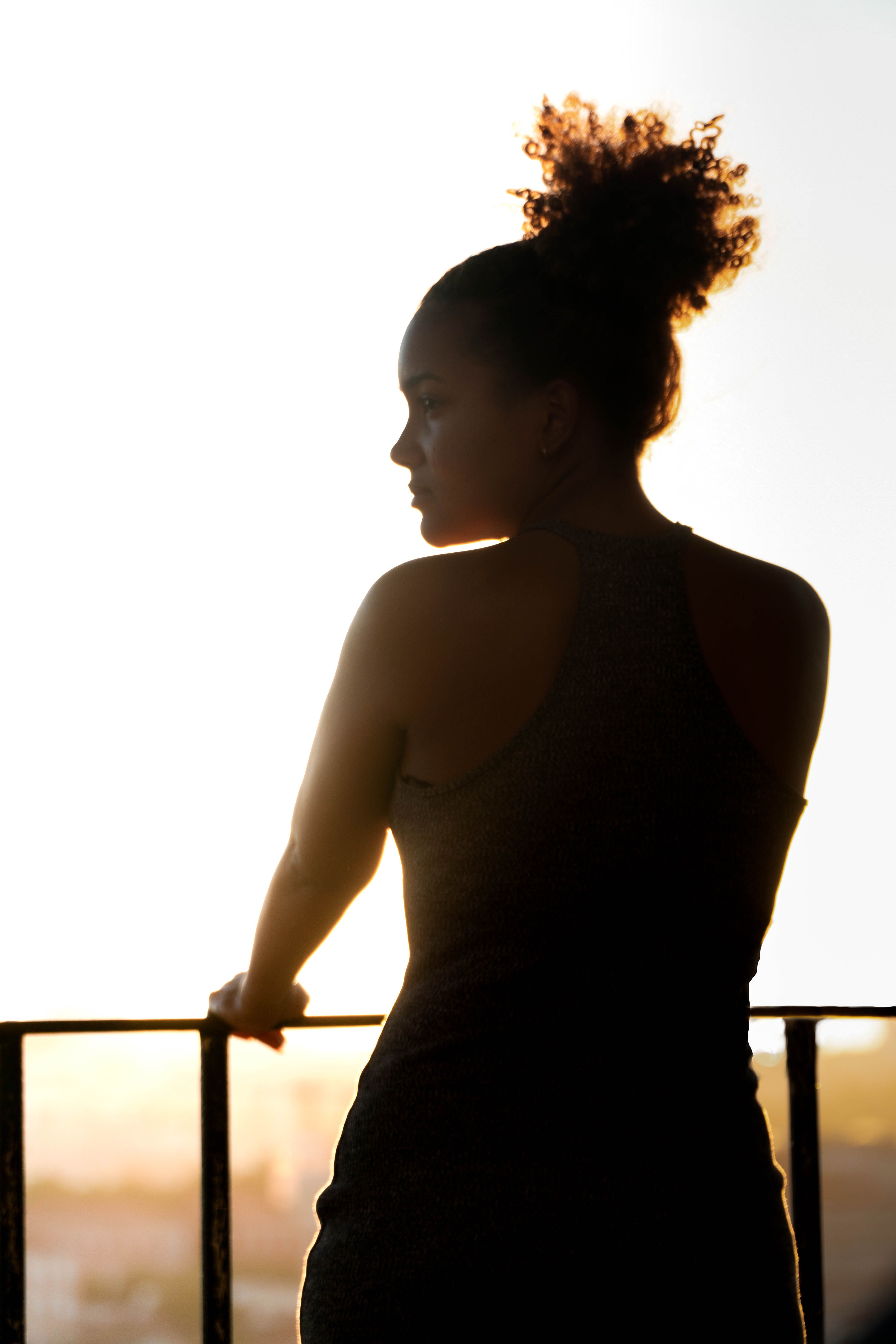 Back View of Woman at Sunset · Free Stock Photo