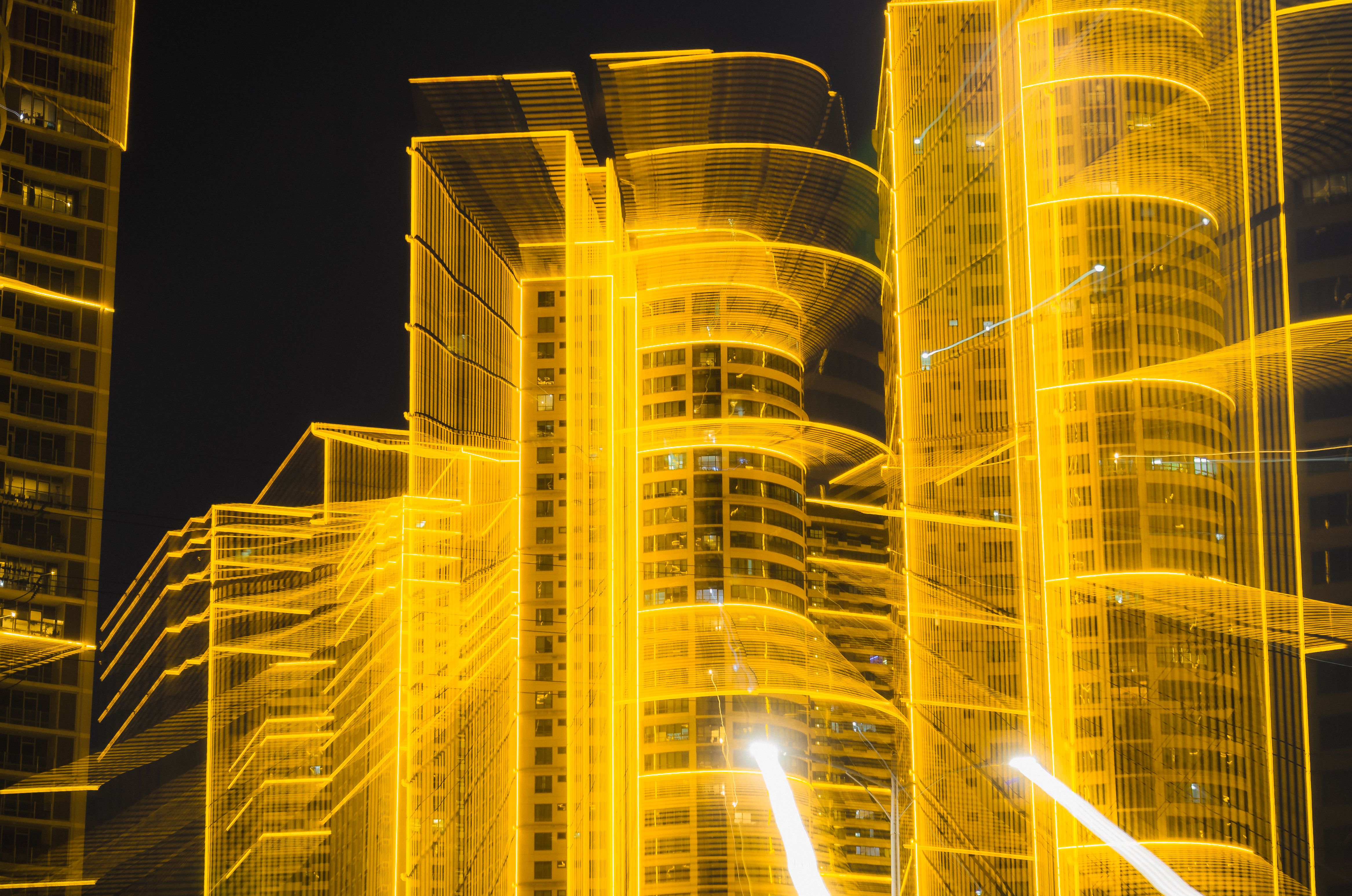 Illuminated Urban Nightscape in Abstract Light · Free Stock Photo