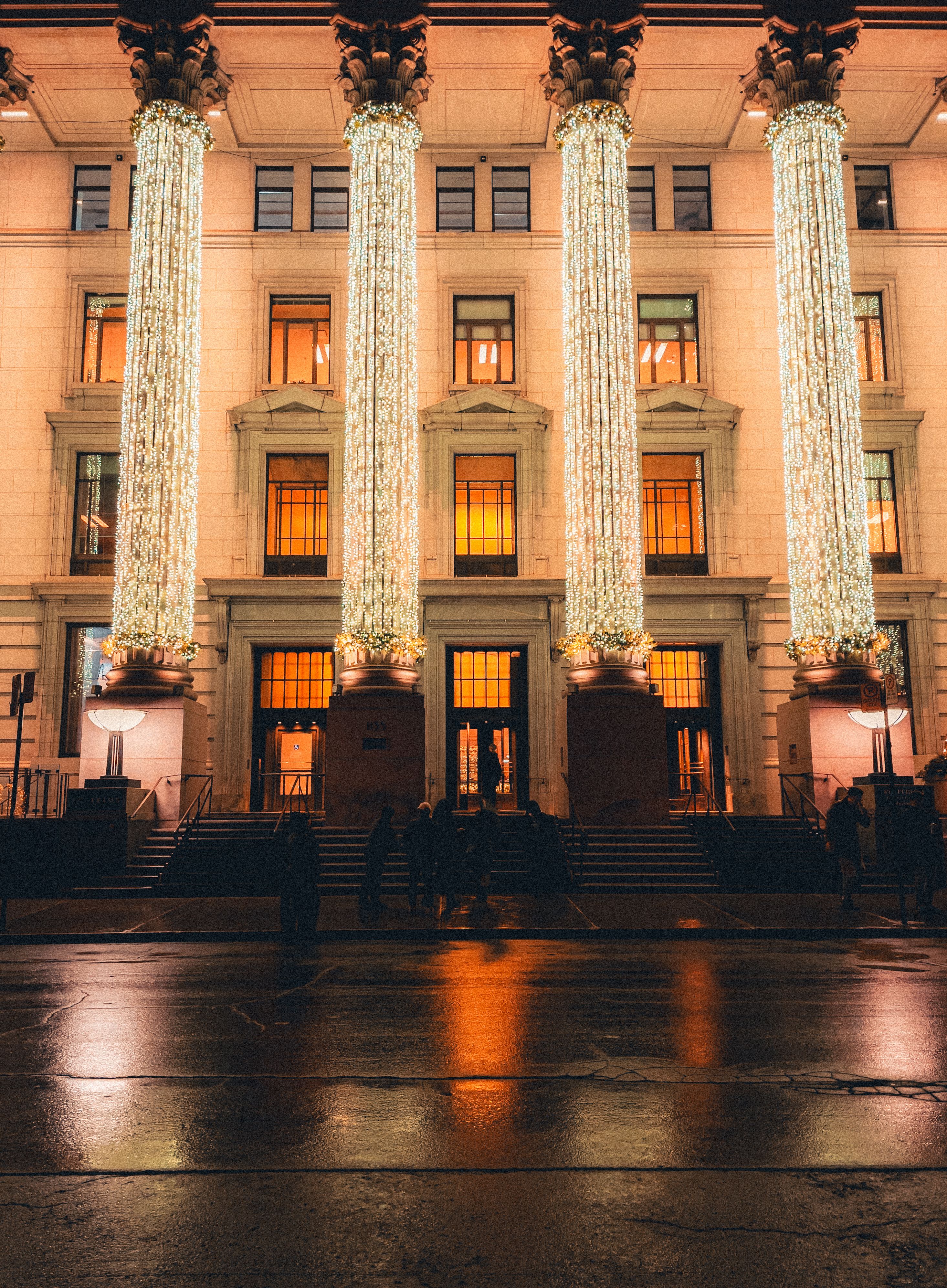 Illuminated Colonnade by Building in City · Free Stock Photo