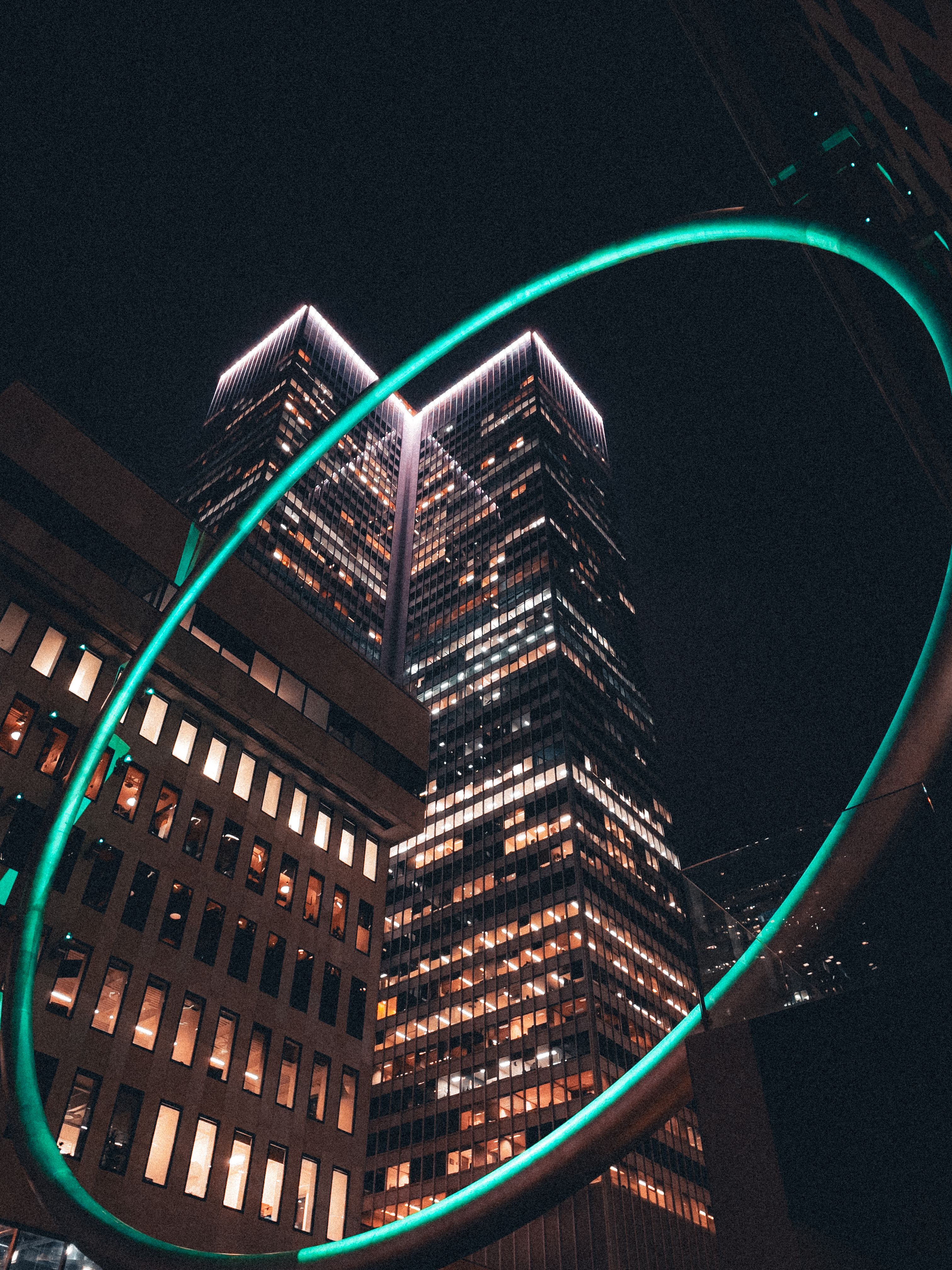 Circle of Light over Financial Skyscraper in City at Night · Free Stock ...