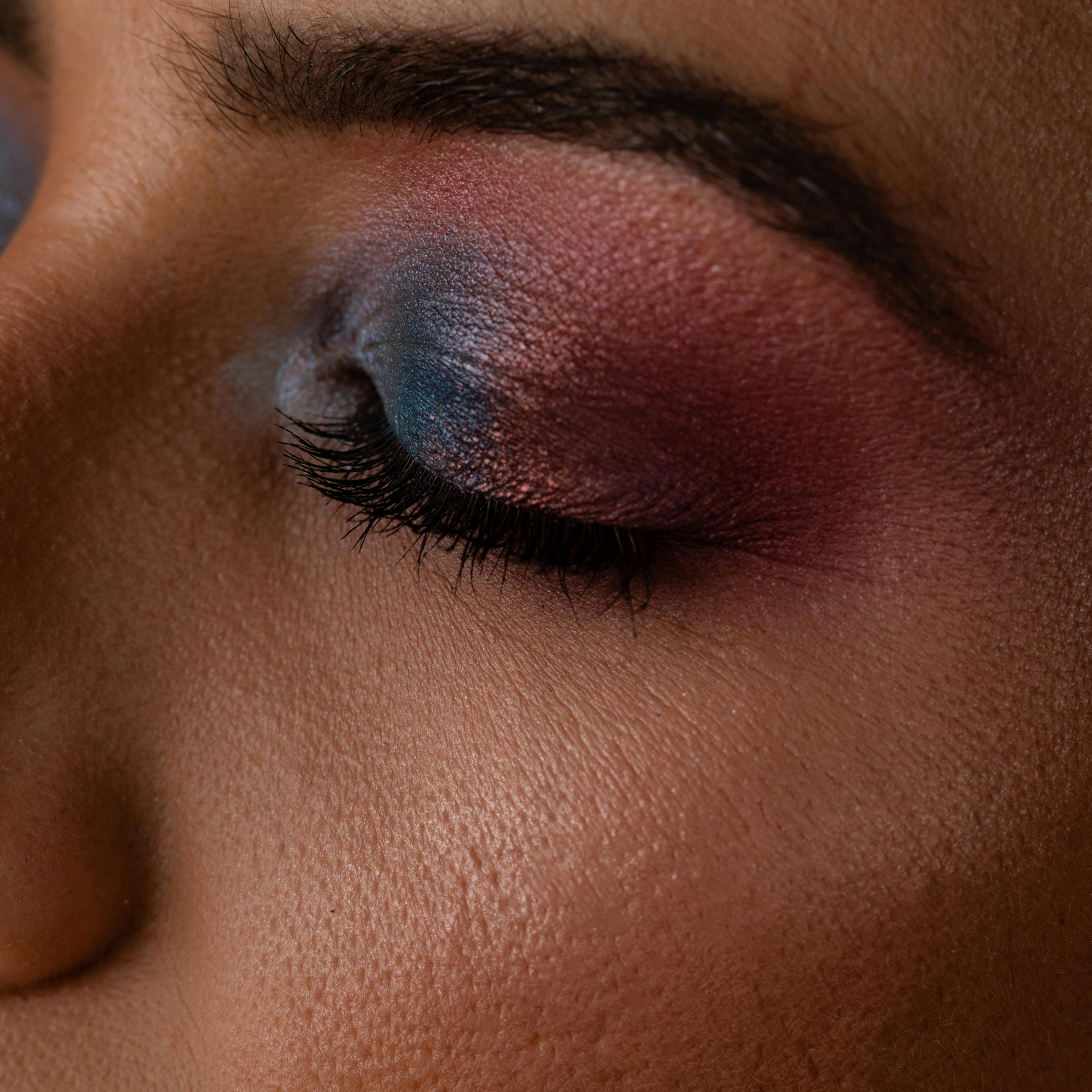 Woman Applying Makeup on Her Face · Free Stock Photo