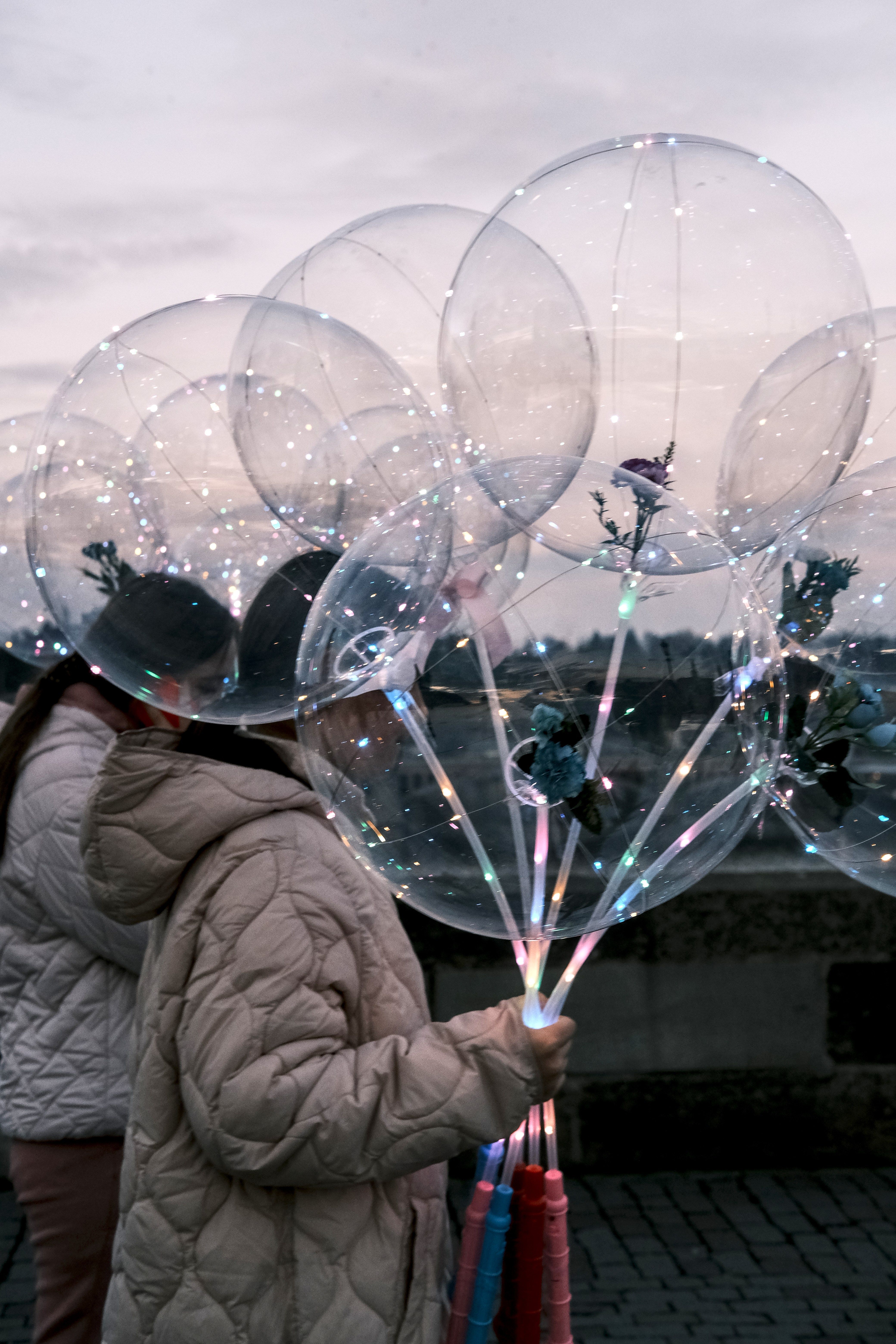 Women Carrying Bubble Balloons · Free Stock Photo