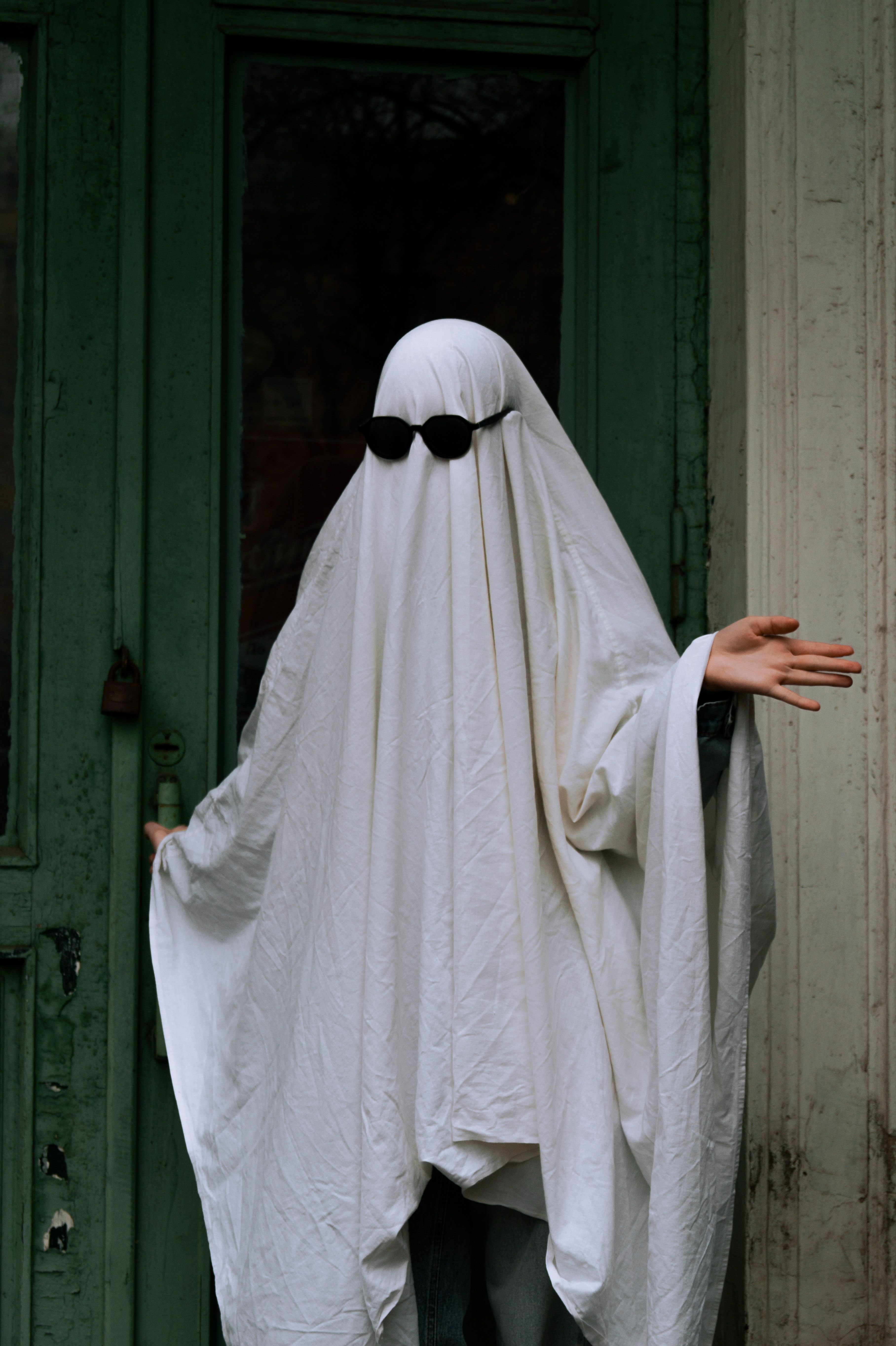 Person in Ghost Costume with Sunglasses · Free Stock Photo
