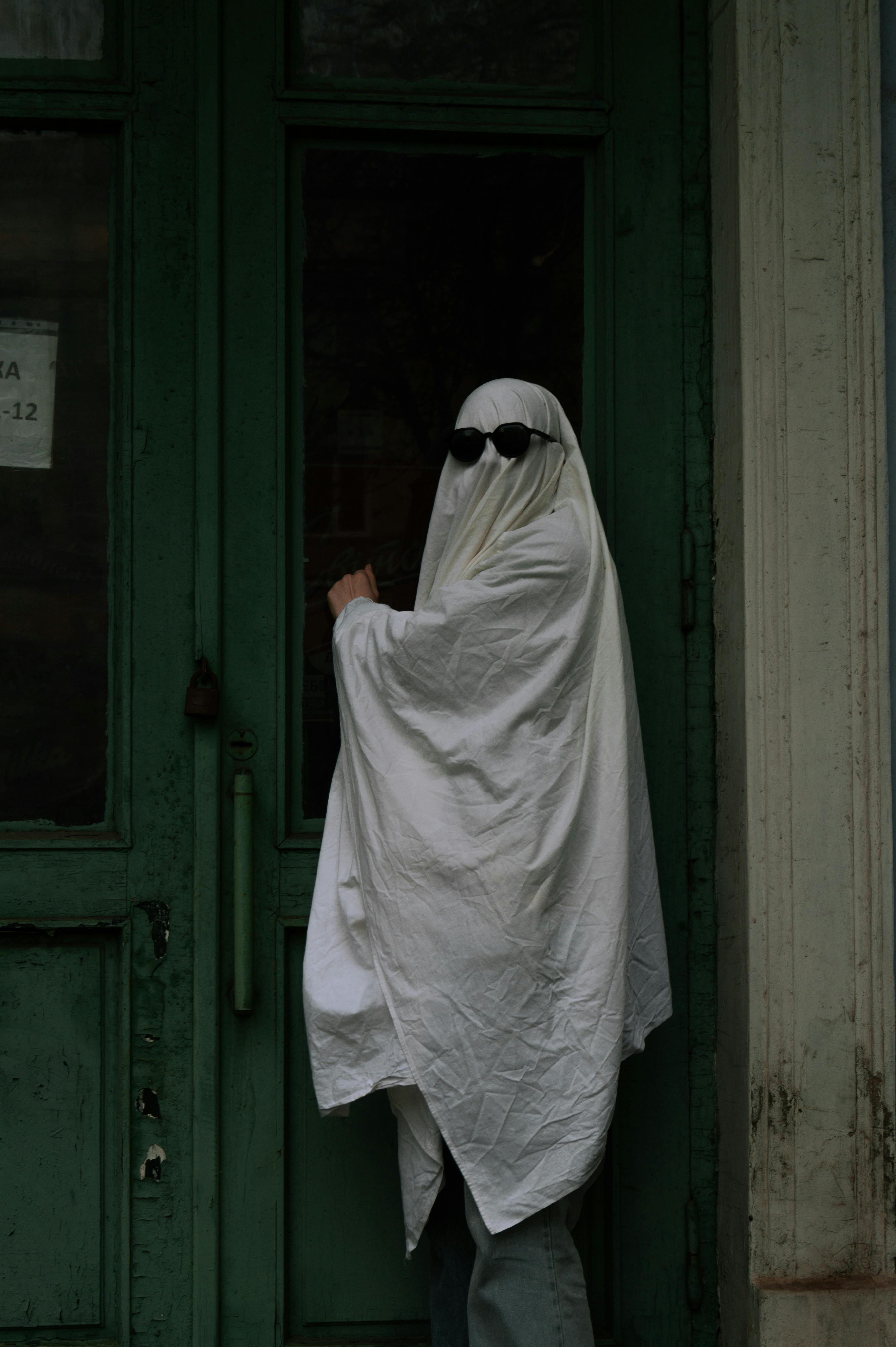 Ghost in Sunglasses Standing near Door · Free Stock Photo