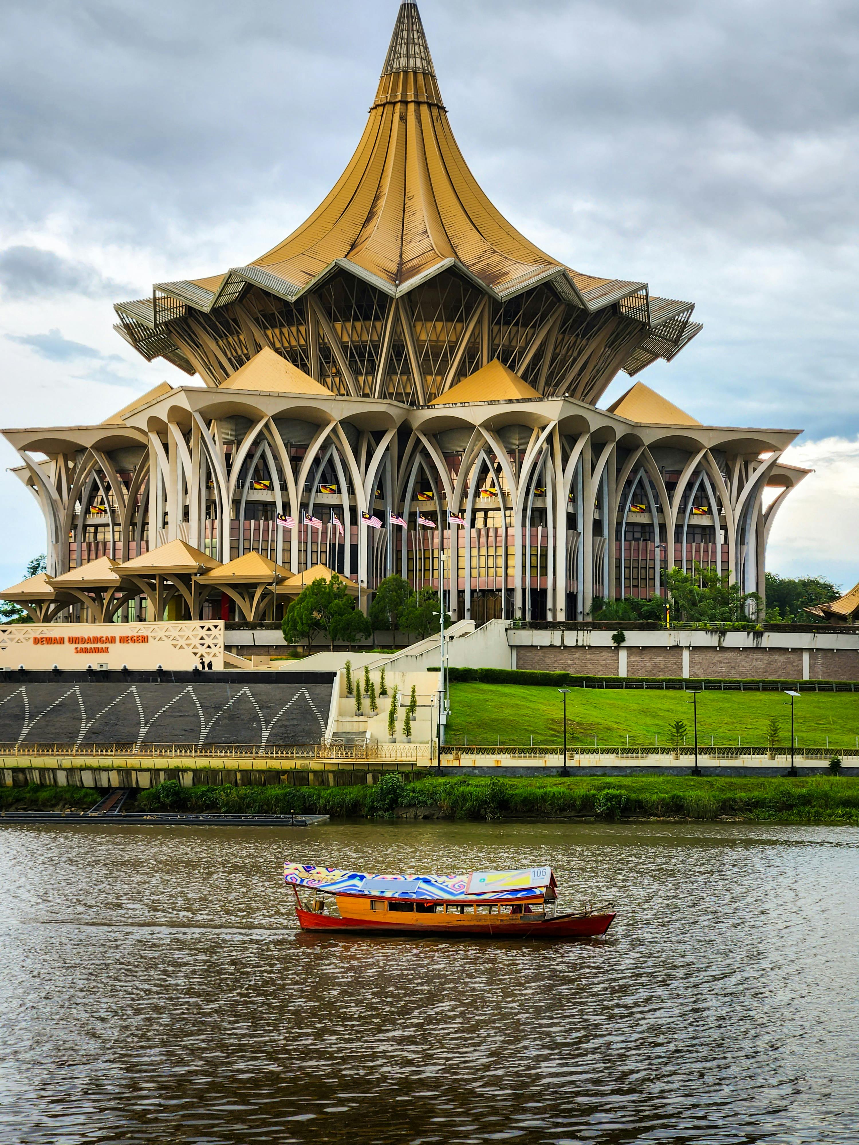 Majestic Building by River · Free Stock Photo