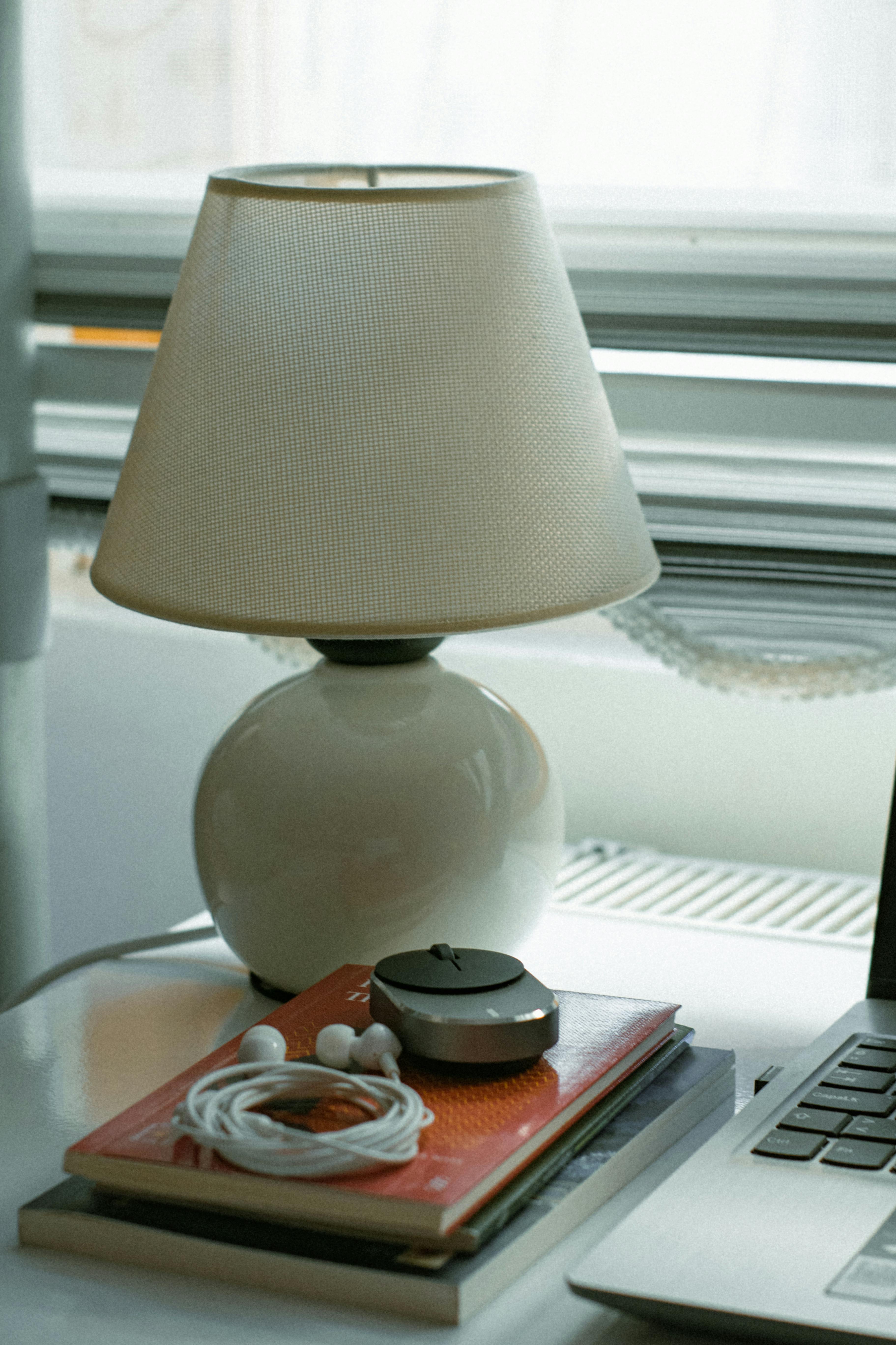 Lamp and Laptop on a Cabinet · Free Stock Photo