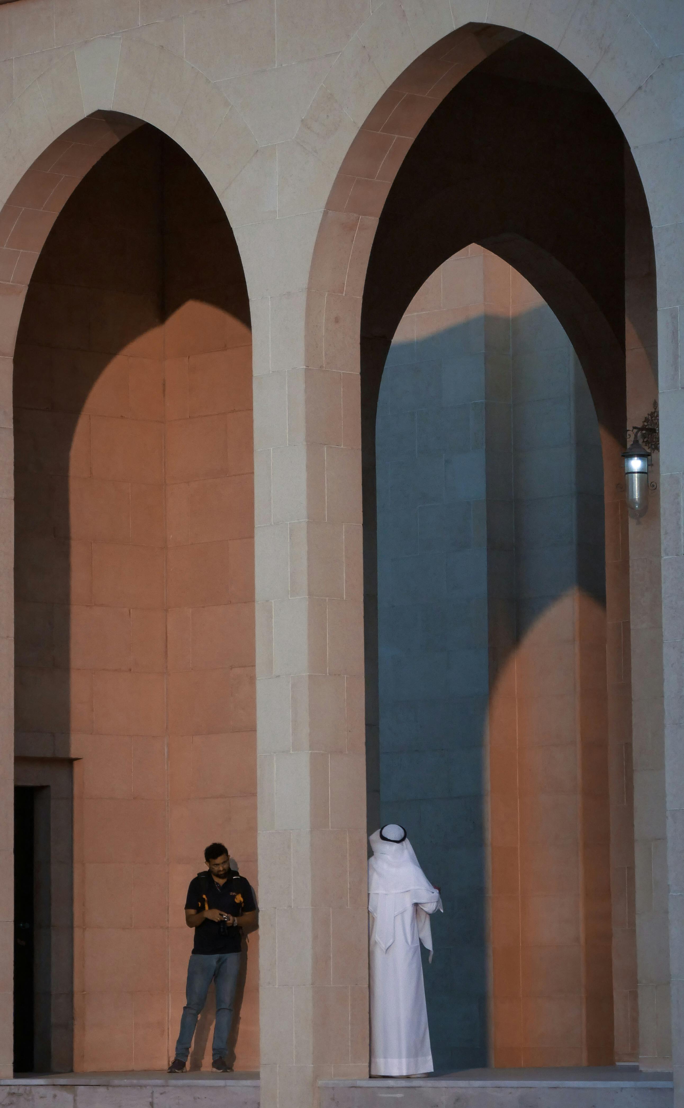 Men Standing outside a Mosque · Free Stock Photo