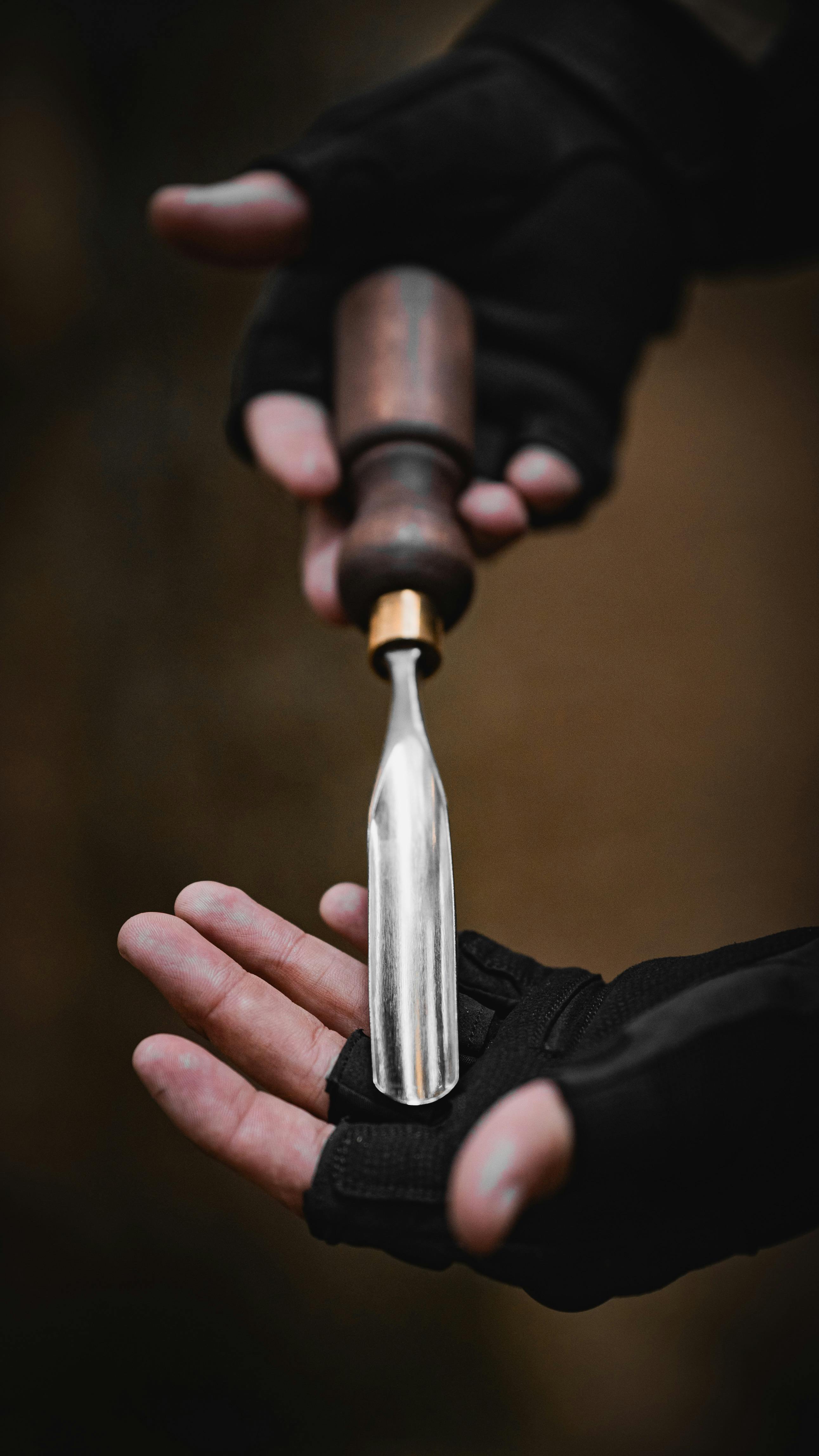 Man Holding Chisel · Free Stock Photo