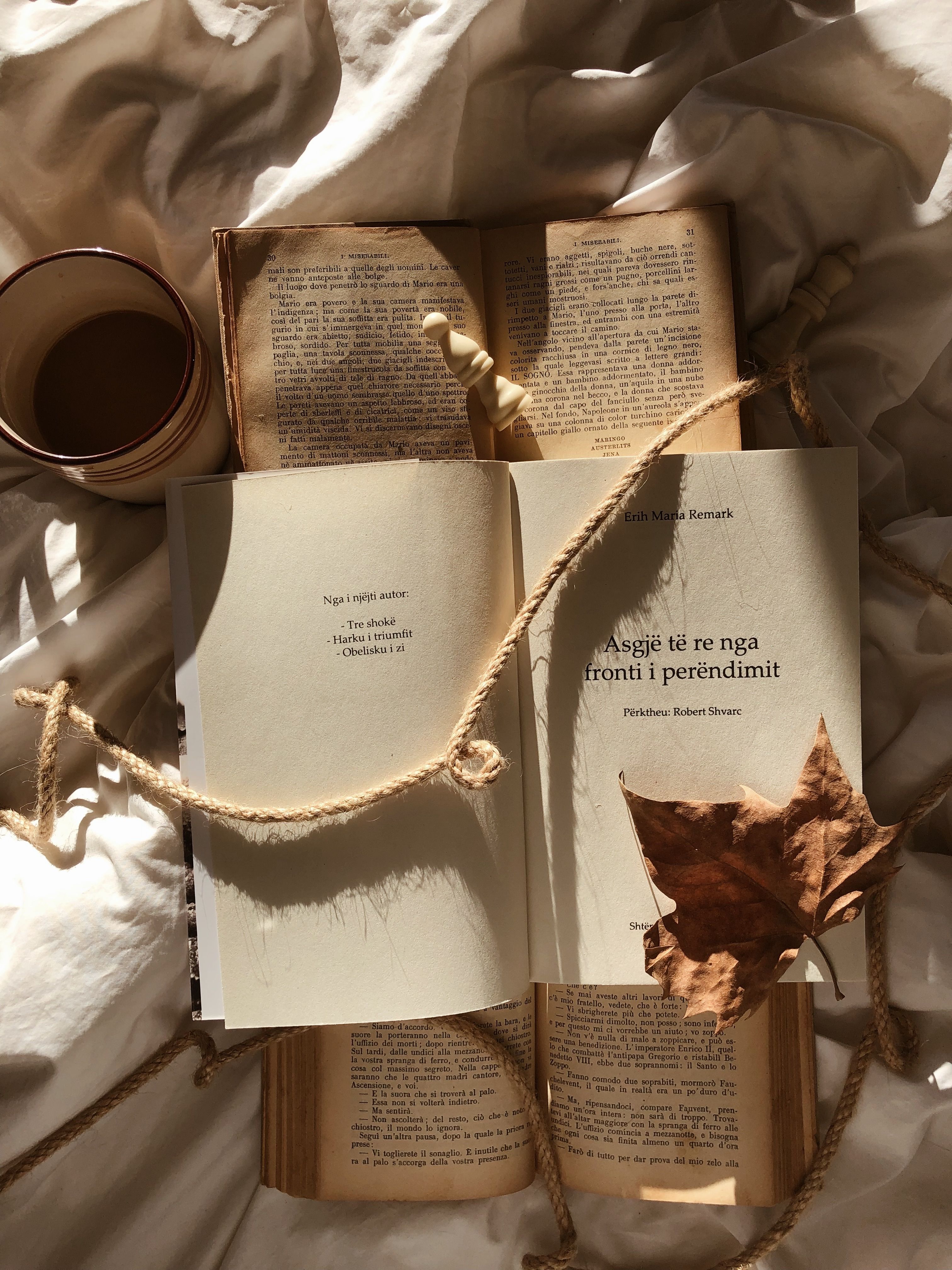 Books, Fallen Leaf, Rope and Coffee on Bed · Free Stock Photo