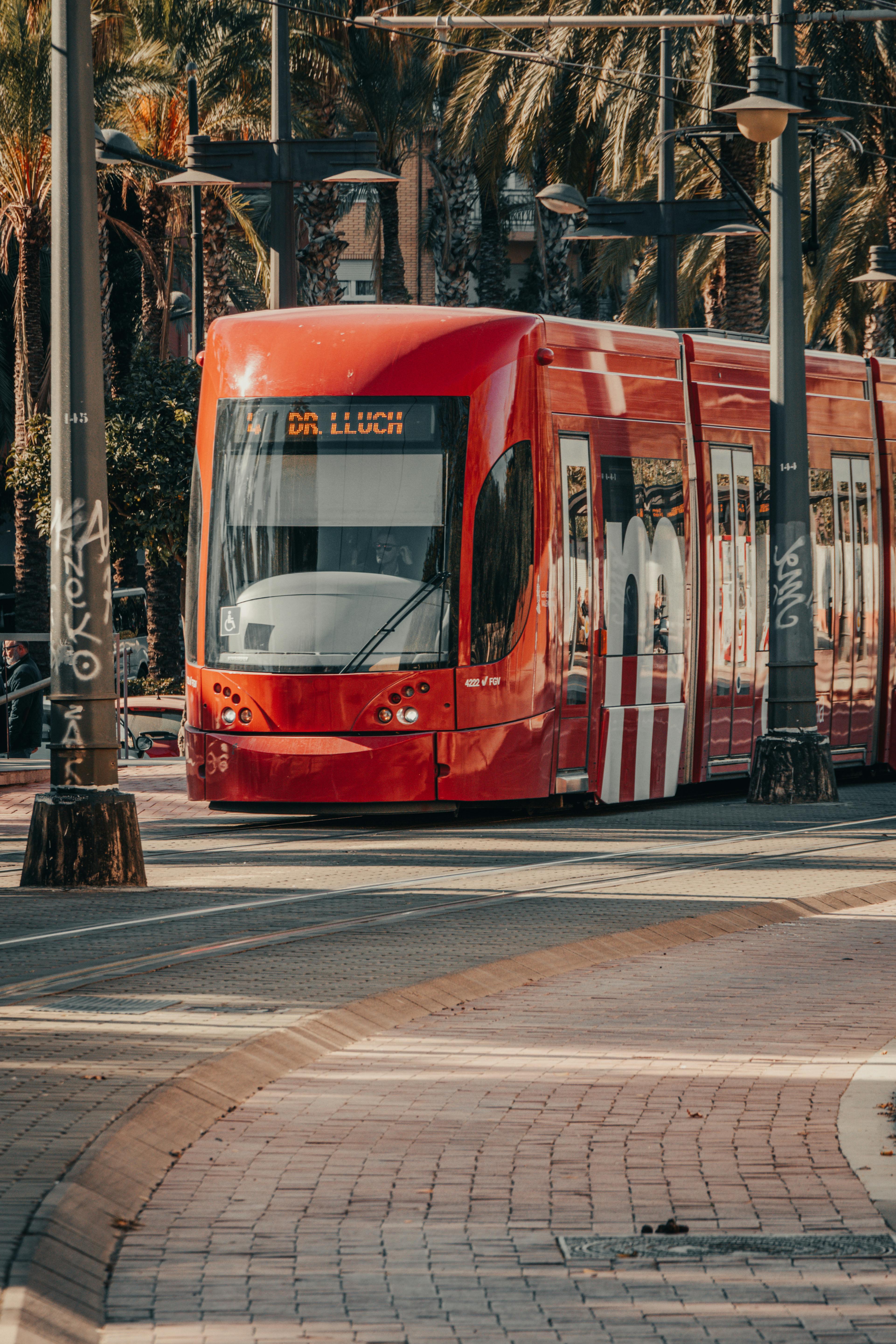 Red Tram on a Street · Free Stock Photo