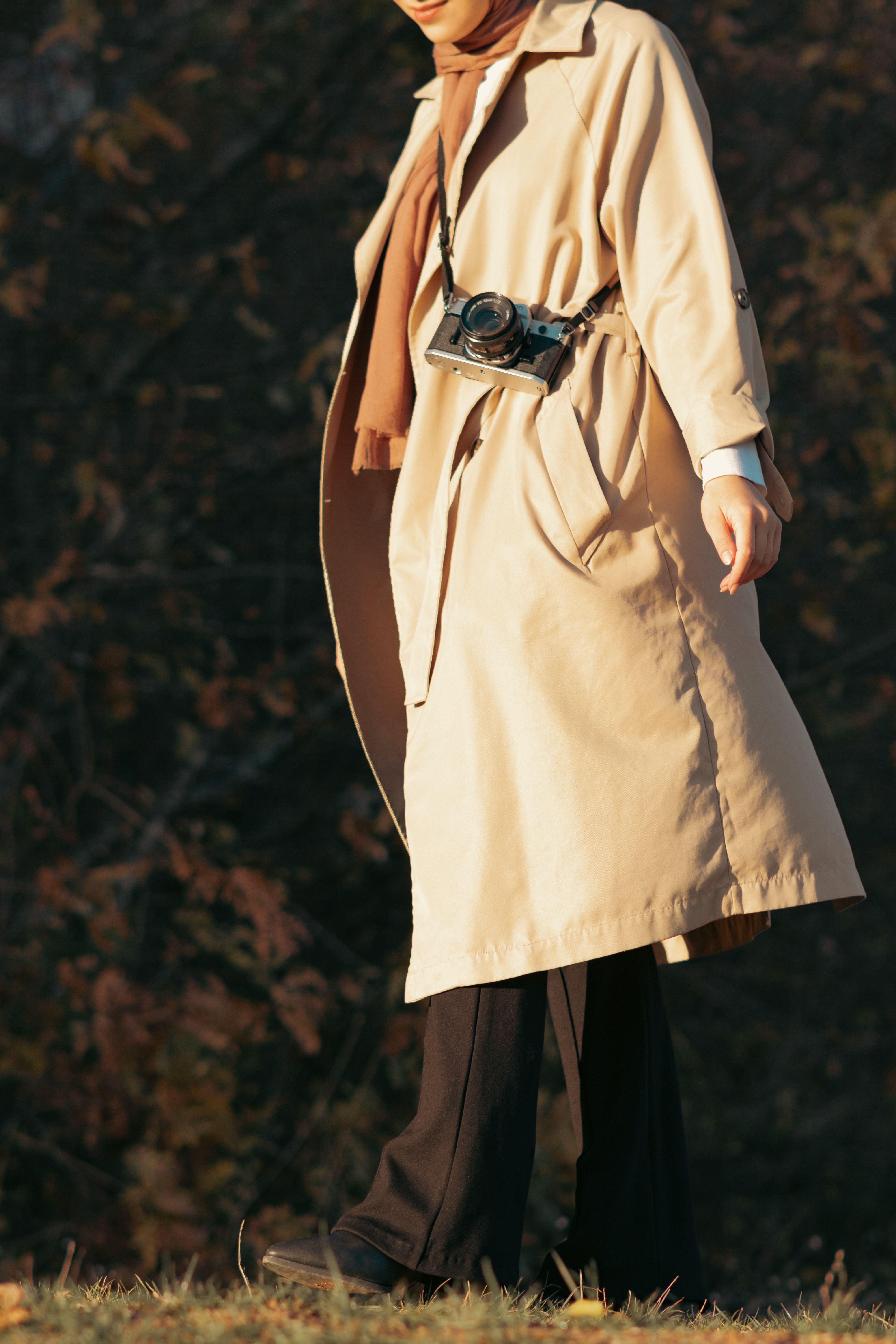 Photographer in Coat with Camera · Free Stock Photo