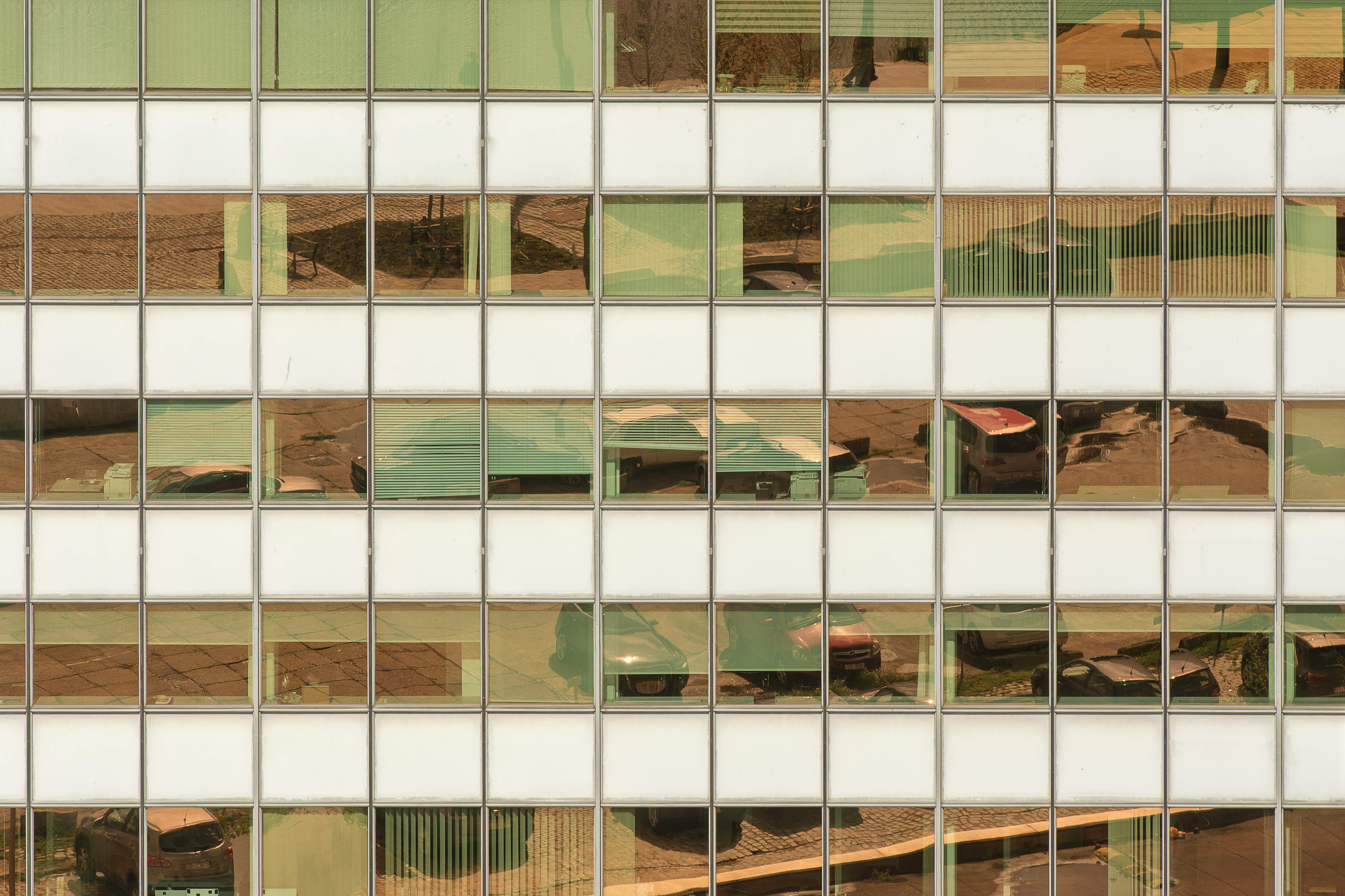 Reflection in Windows of Modern Building · Free Stock Photo
