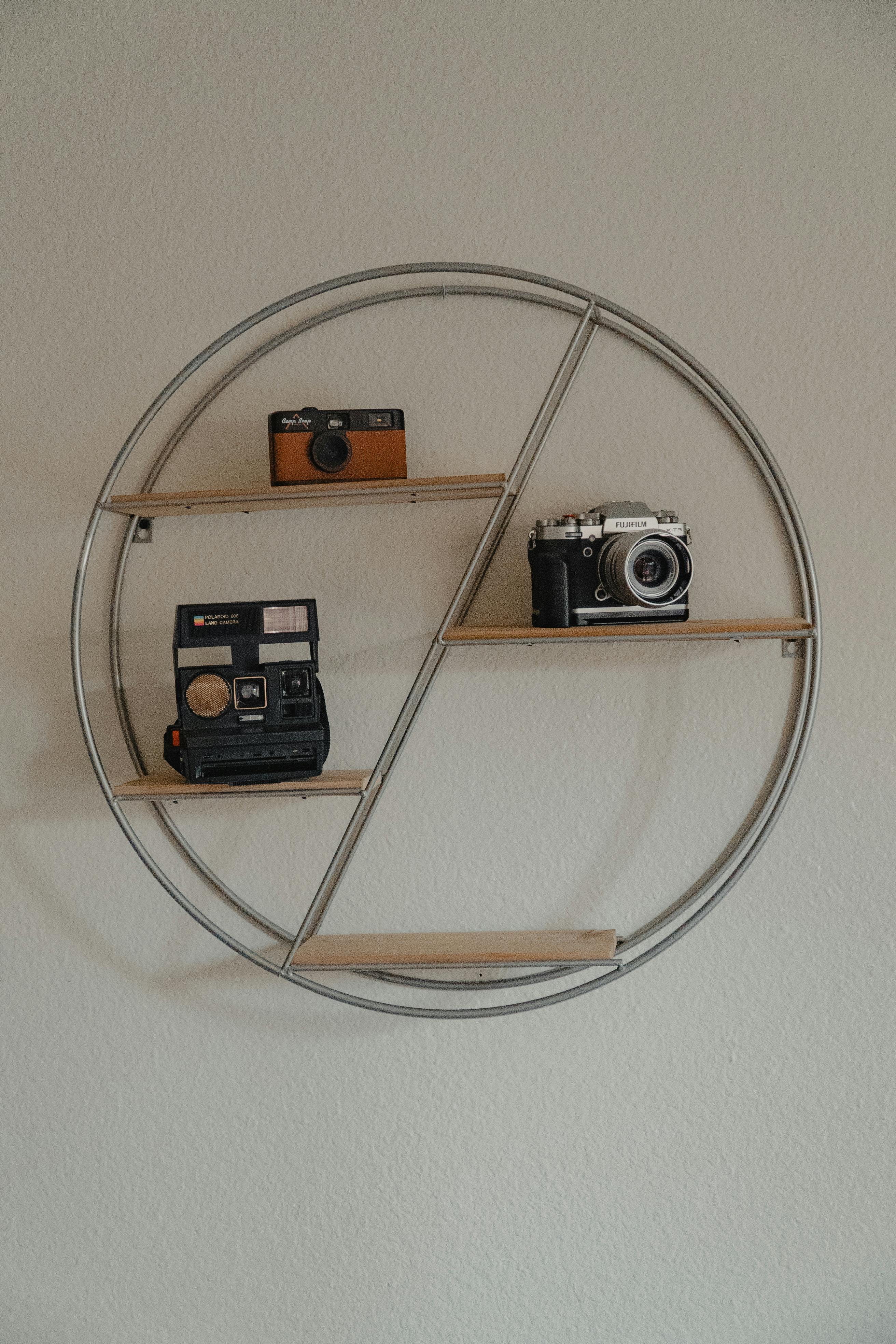 Vintage Cameras on Shelves · Free Stock Photo