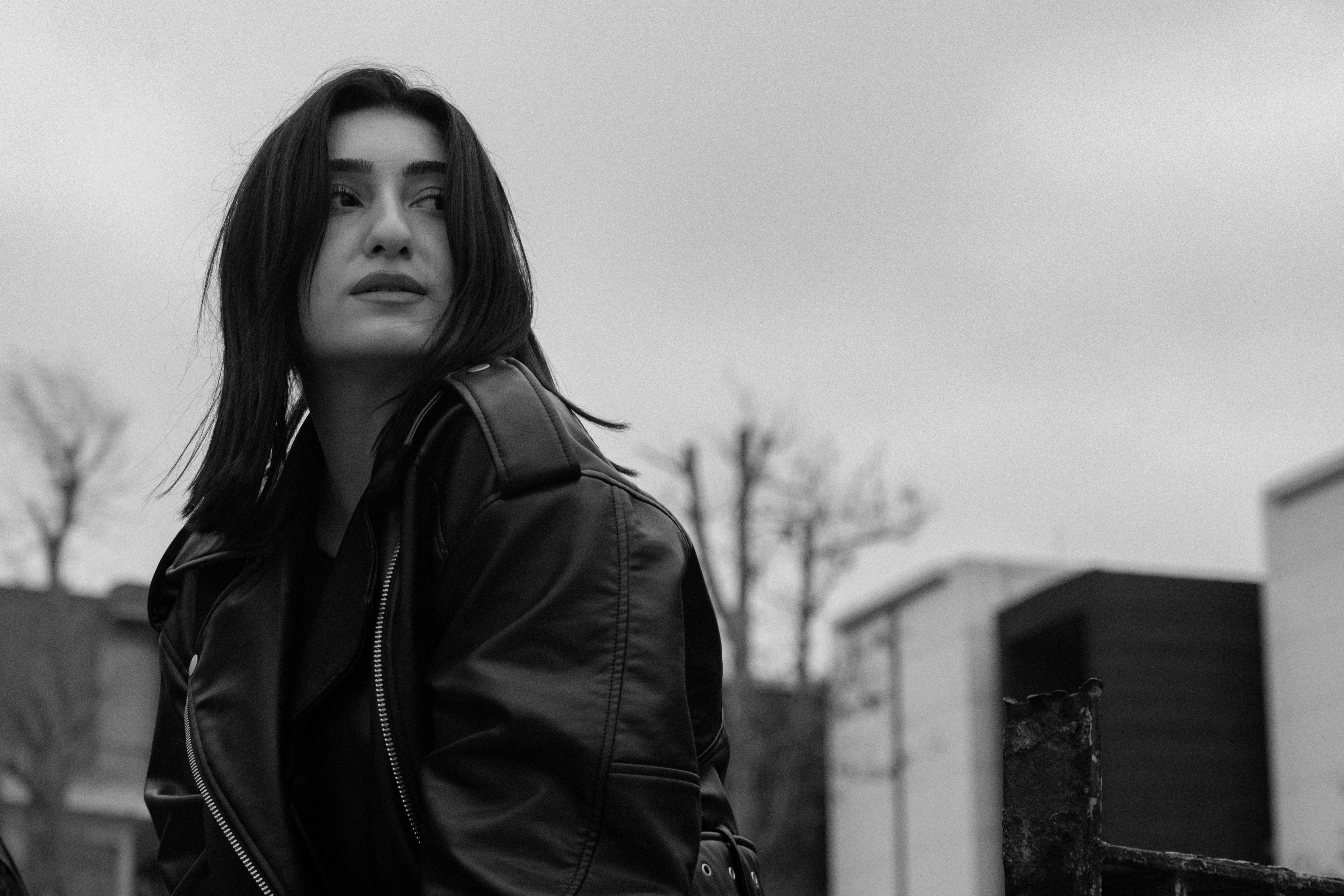 Woman in Unzipped Leather Jacket · Free Stock Photo