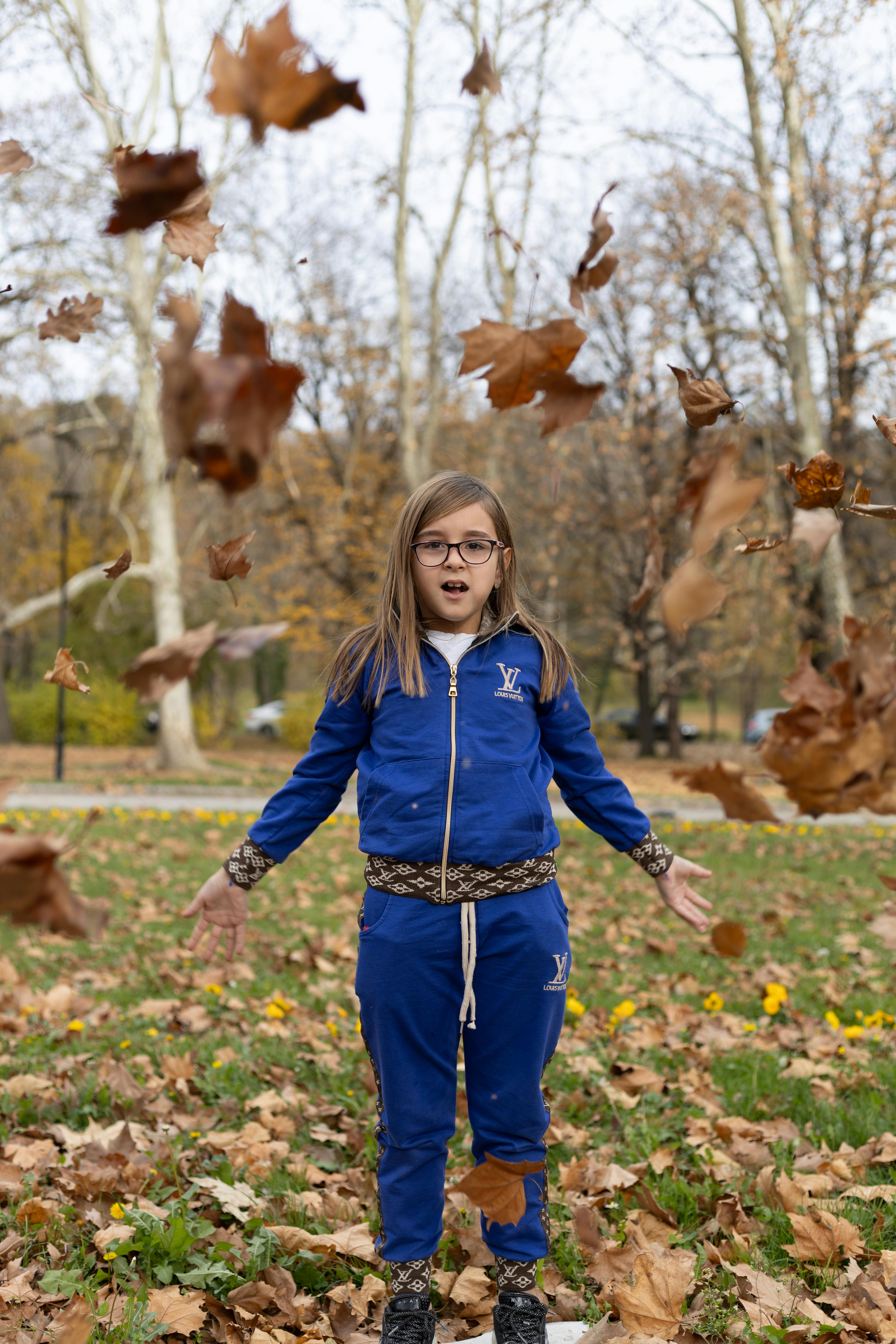Photo of Girl Standing While Smiling · Free Stock Photo