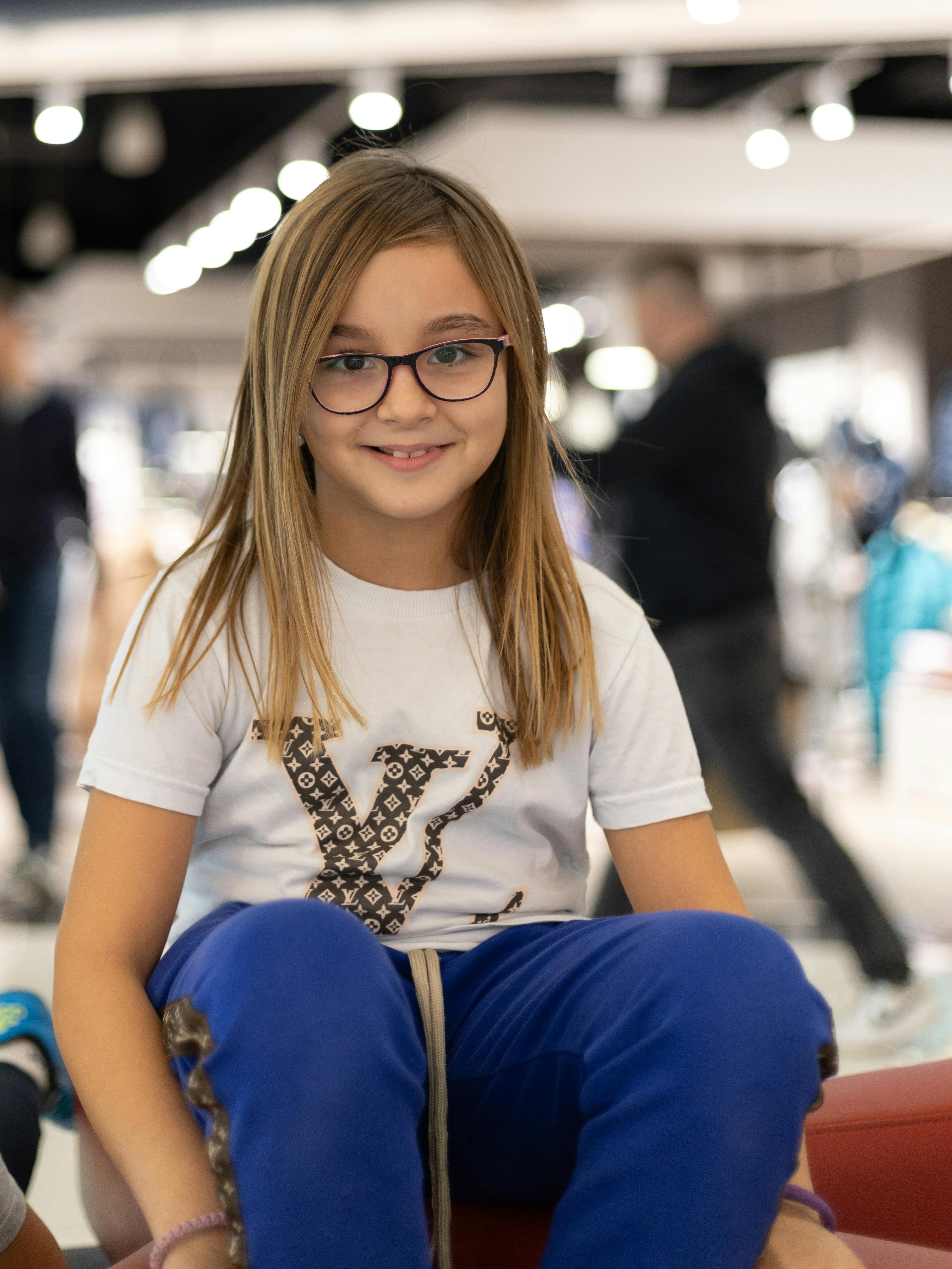 Smiling Little Girl with Eyeglasses · Free Stock Photo