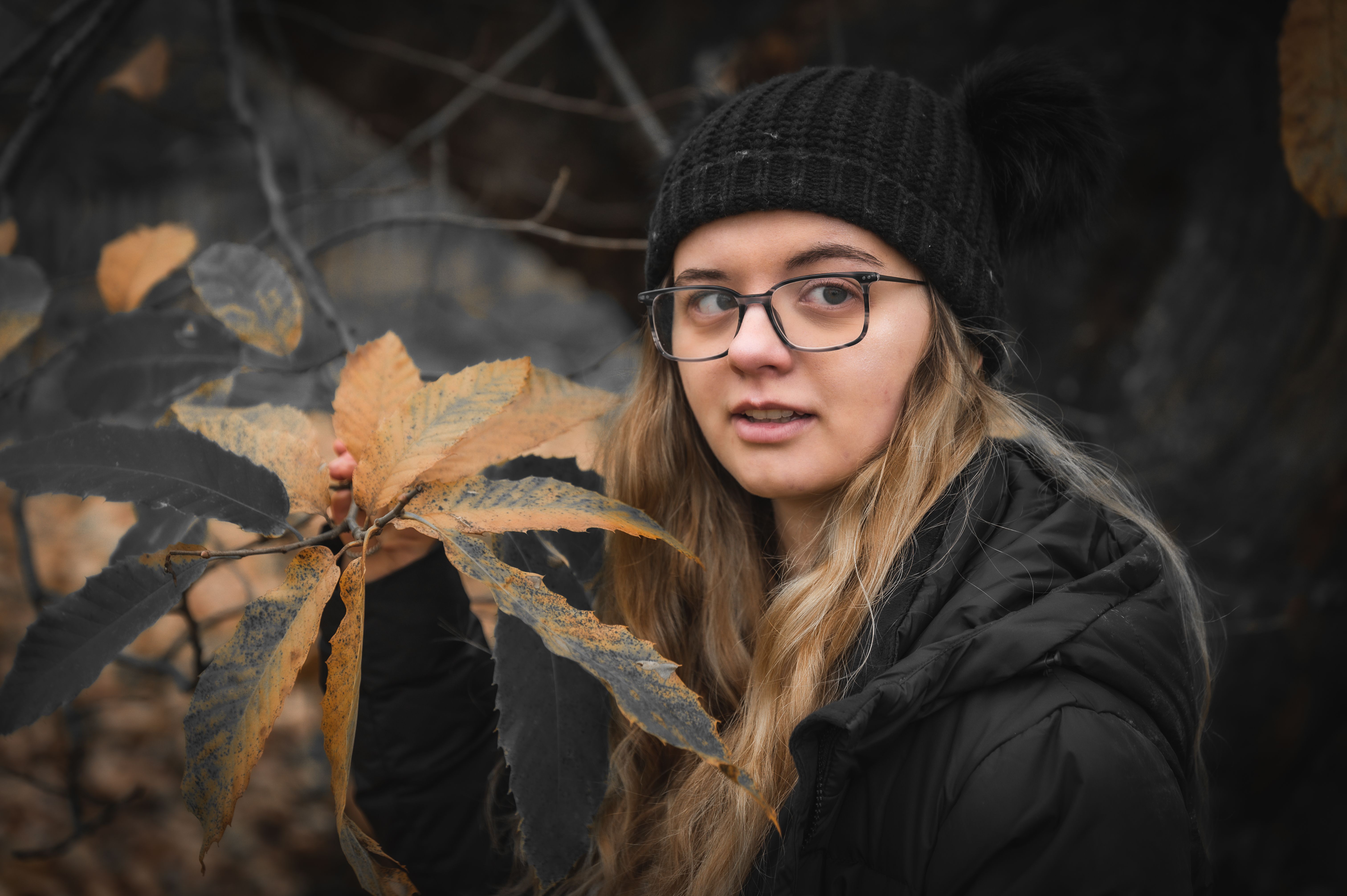 Woman in Hat and Eyeglasses with Autumn Leaves · Free Stock Photo