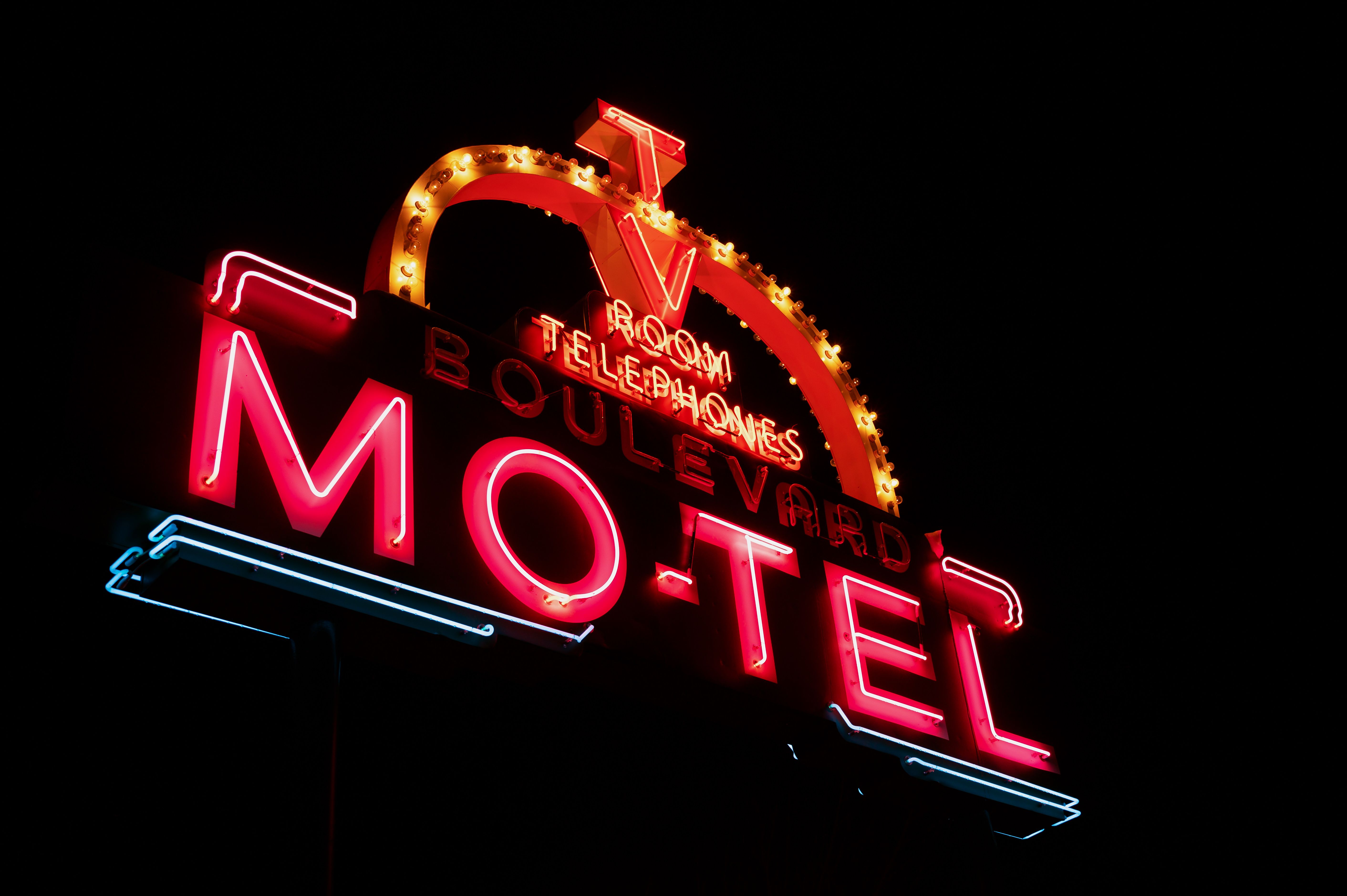 Photo of Red and Orange Motel Neon Signage · Free Stock Photo