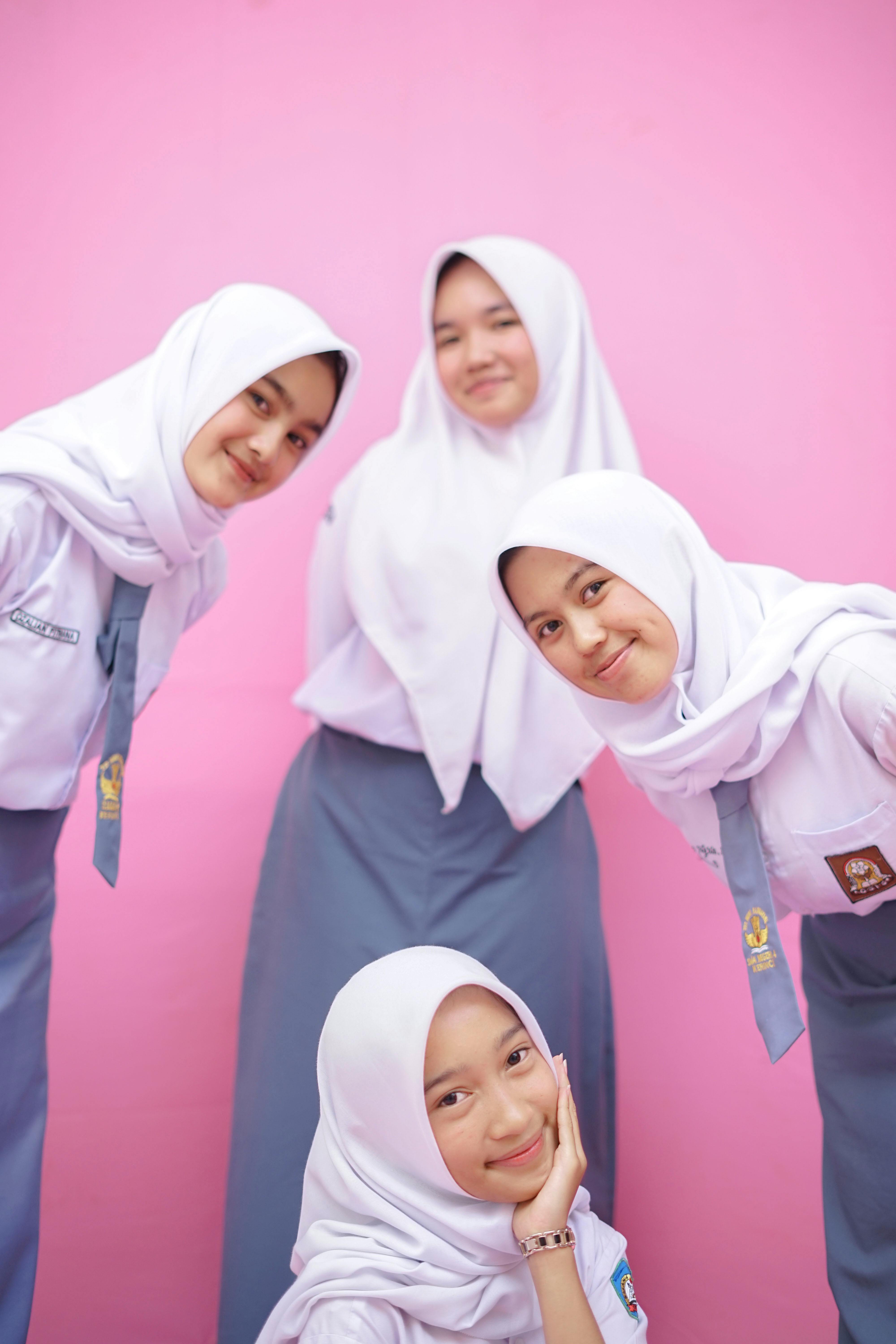 Indonesian Schoolgirls in Uniform Celebrating · Free Stock Photo