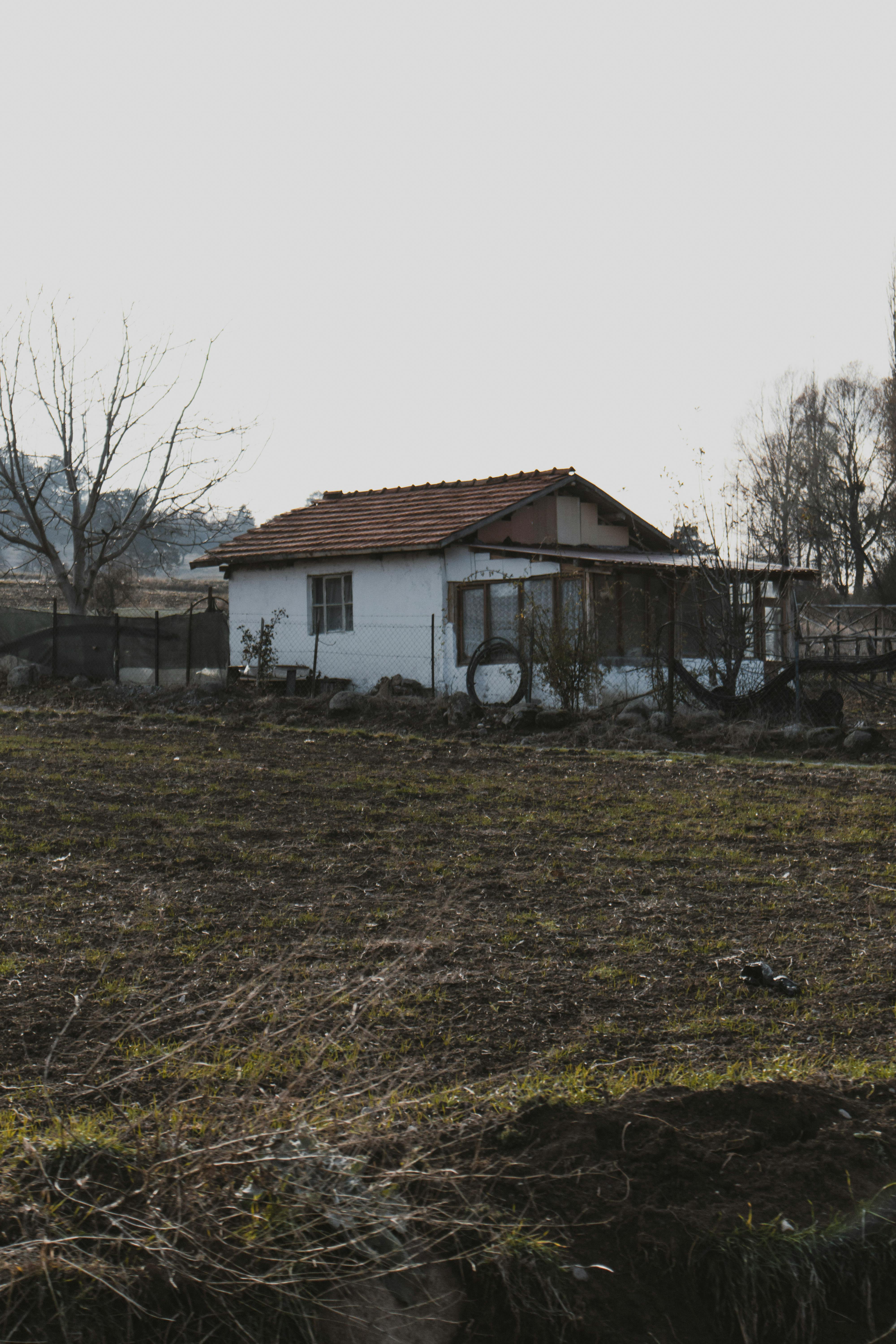 Agricultural Field and a House · Free Stock Photo