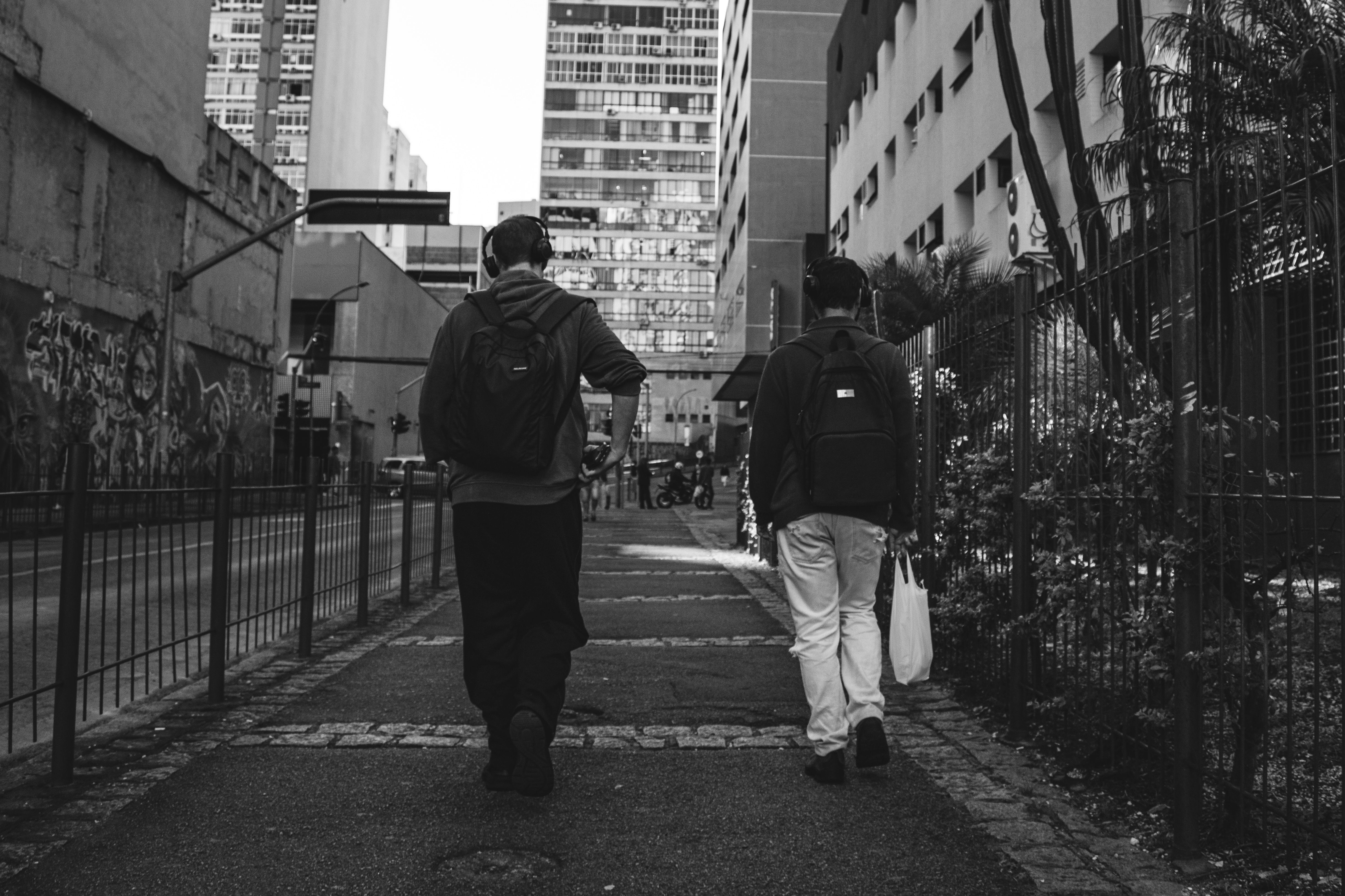Back View of Pedestrians on the Sidewalk in City · Free Stock Photo