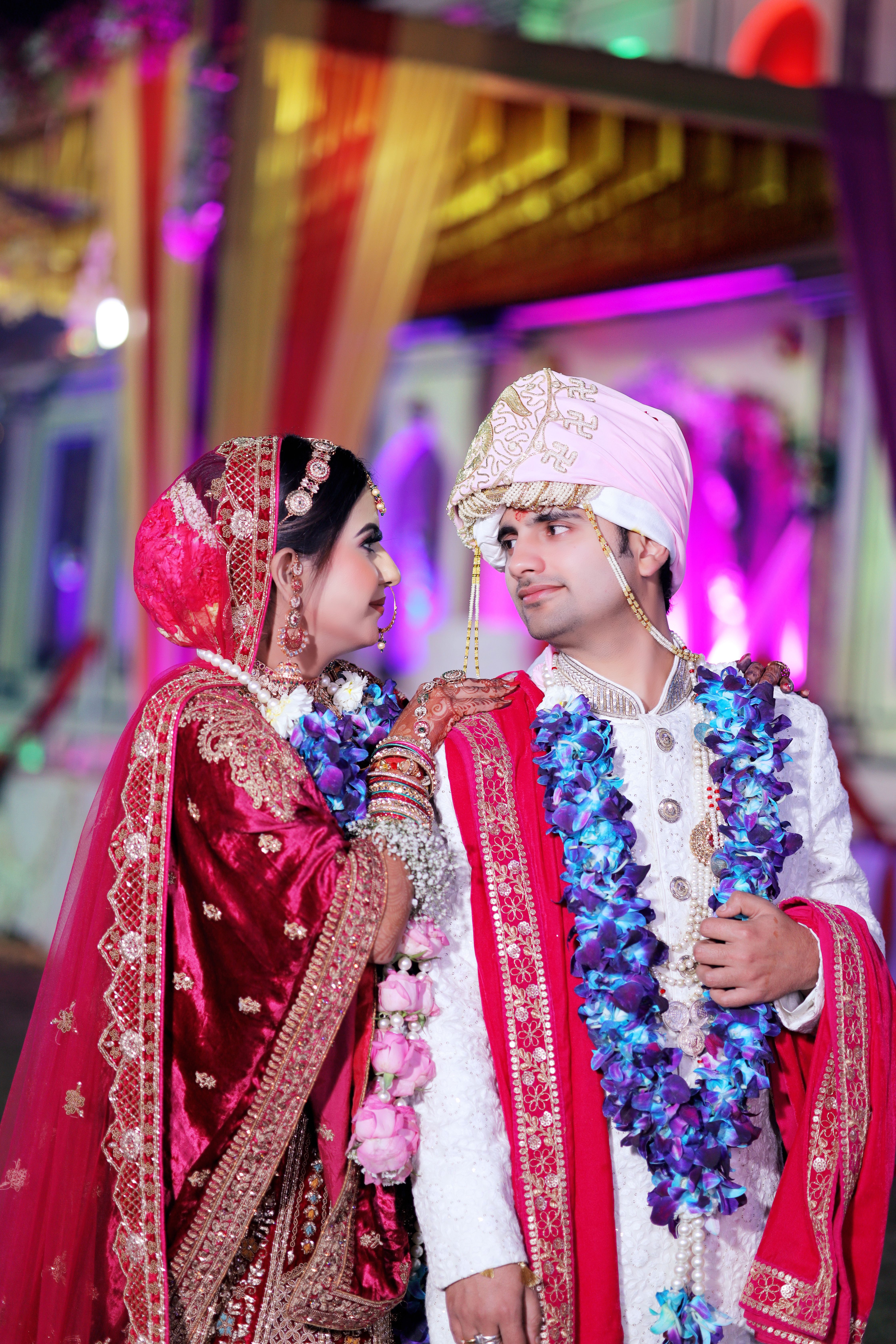 Bride and Groom in Traditional Clothing Standing Close to Each Other ...