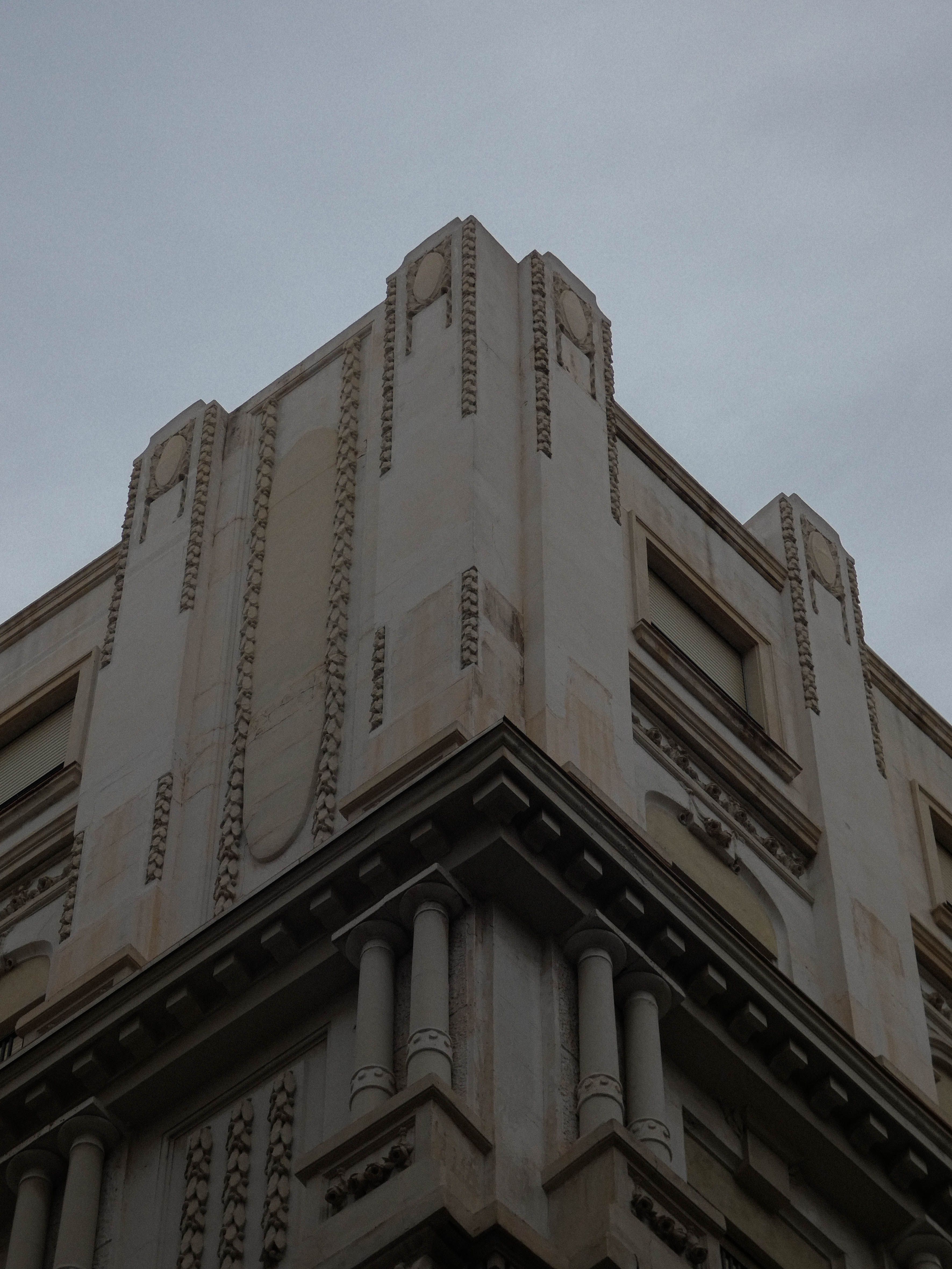 Low Angle Shot of a Building with Carved Details on the Facade · Free ...