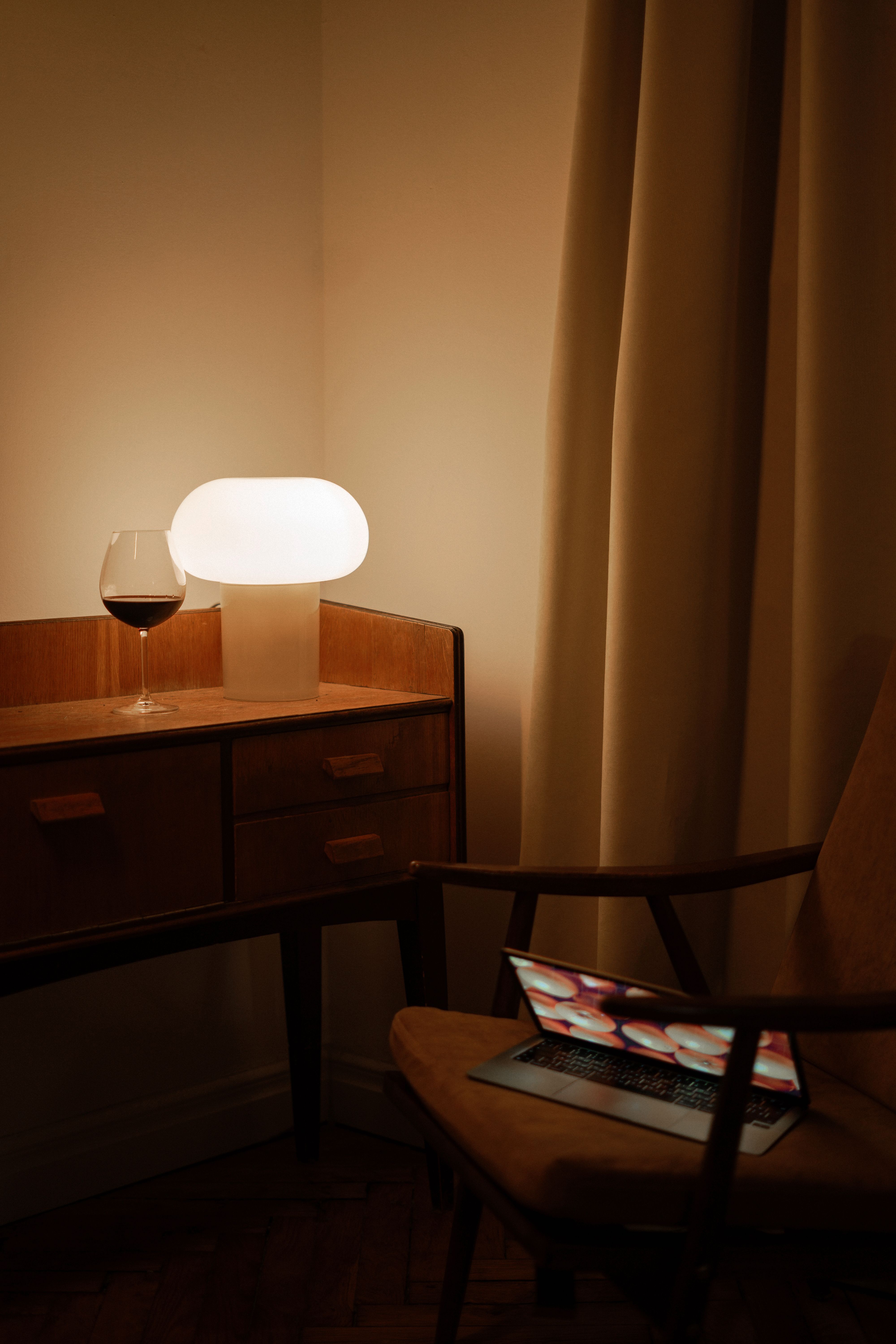 Red Wine Glass on Desk in a Hotel Room · Free Stock Photo