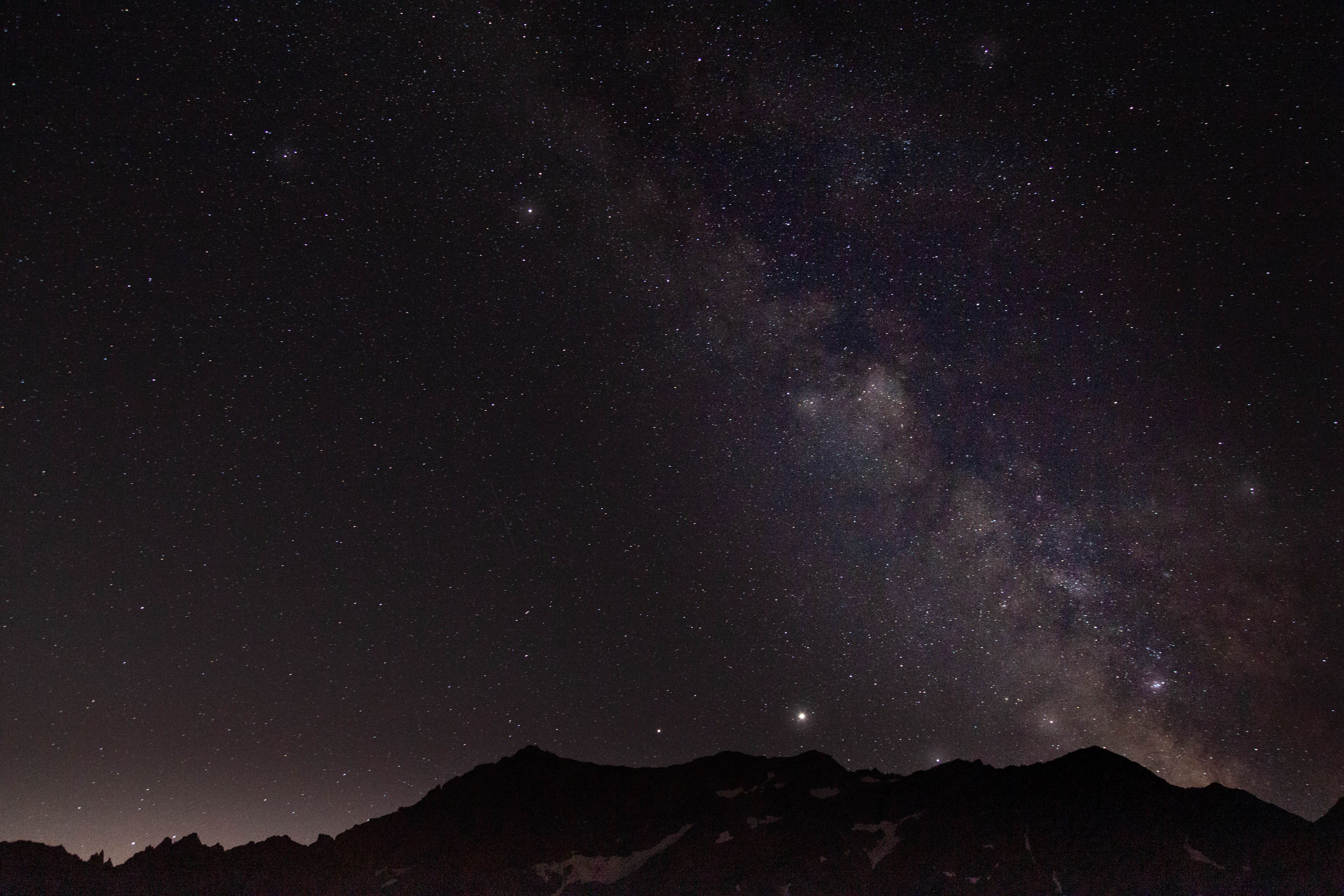 Constellation in Night Sky over Hill · Free Stock Photo