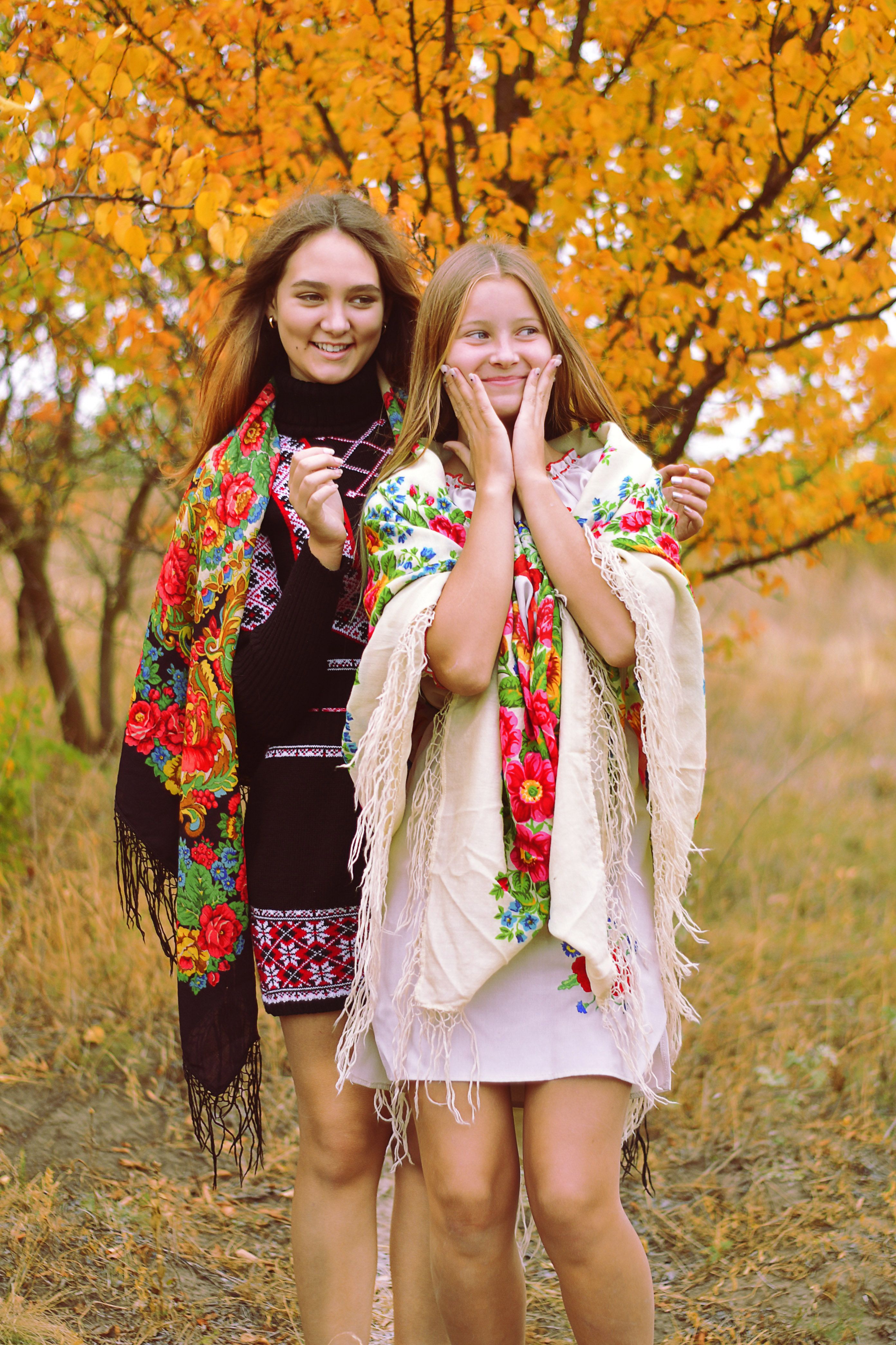 Women Wearing Traditional Scarfs in a Park in Fall · Free Stock Photo