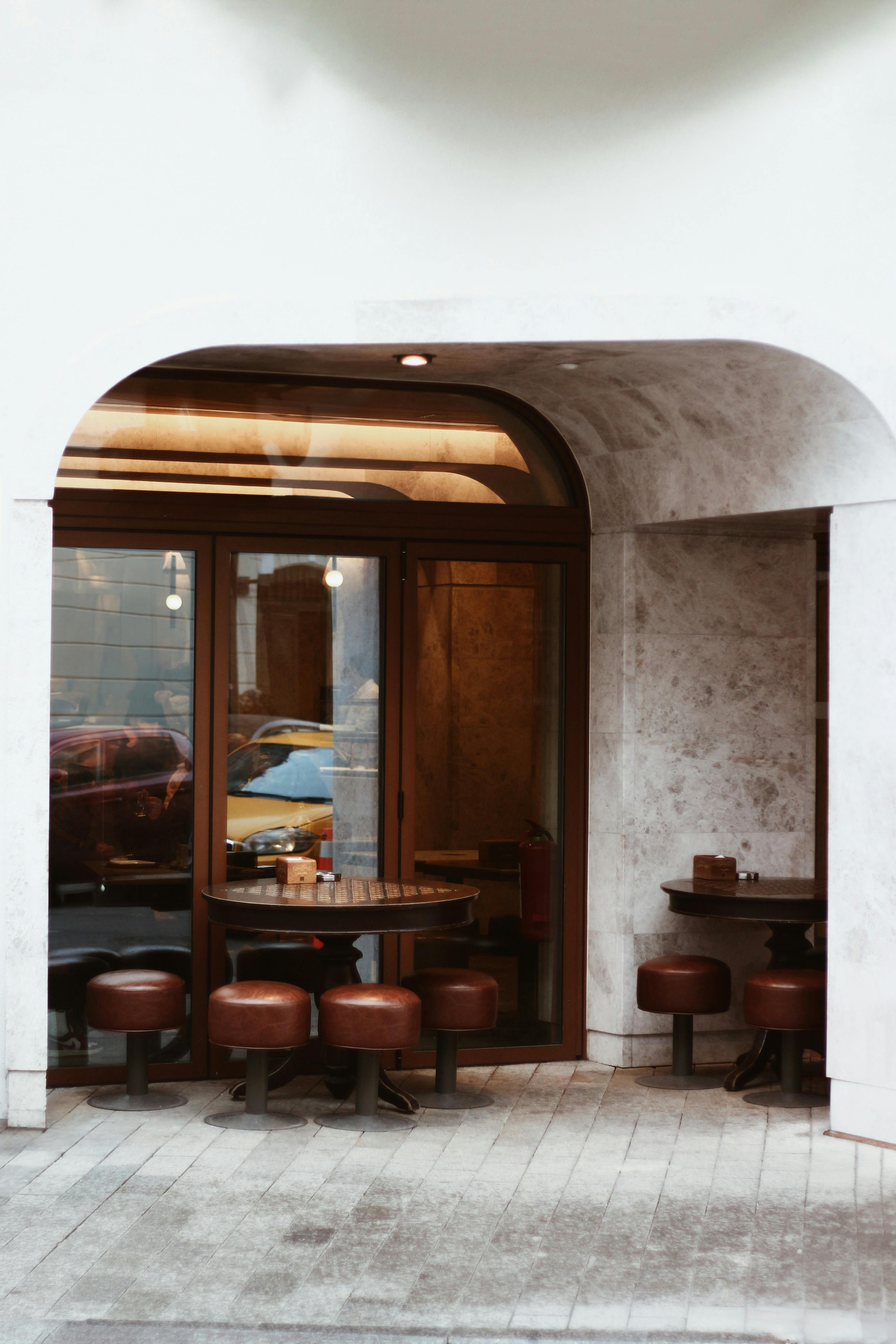 Restaurant Table and Chairs near Windows · Free Stock Photo